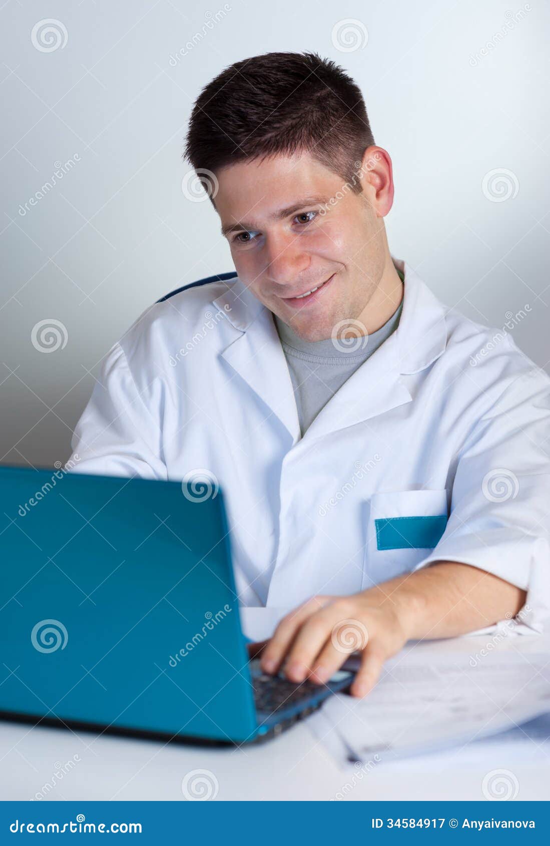 Young Scientist with Computer Stock Image - Image of smile, table: 34584917