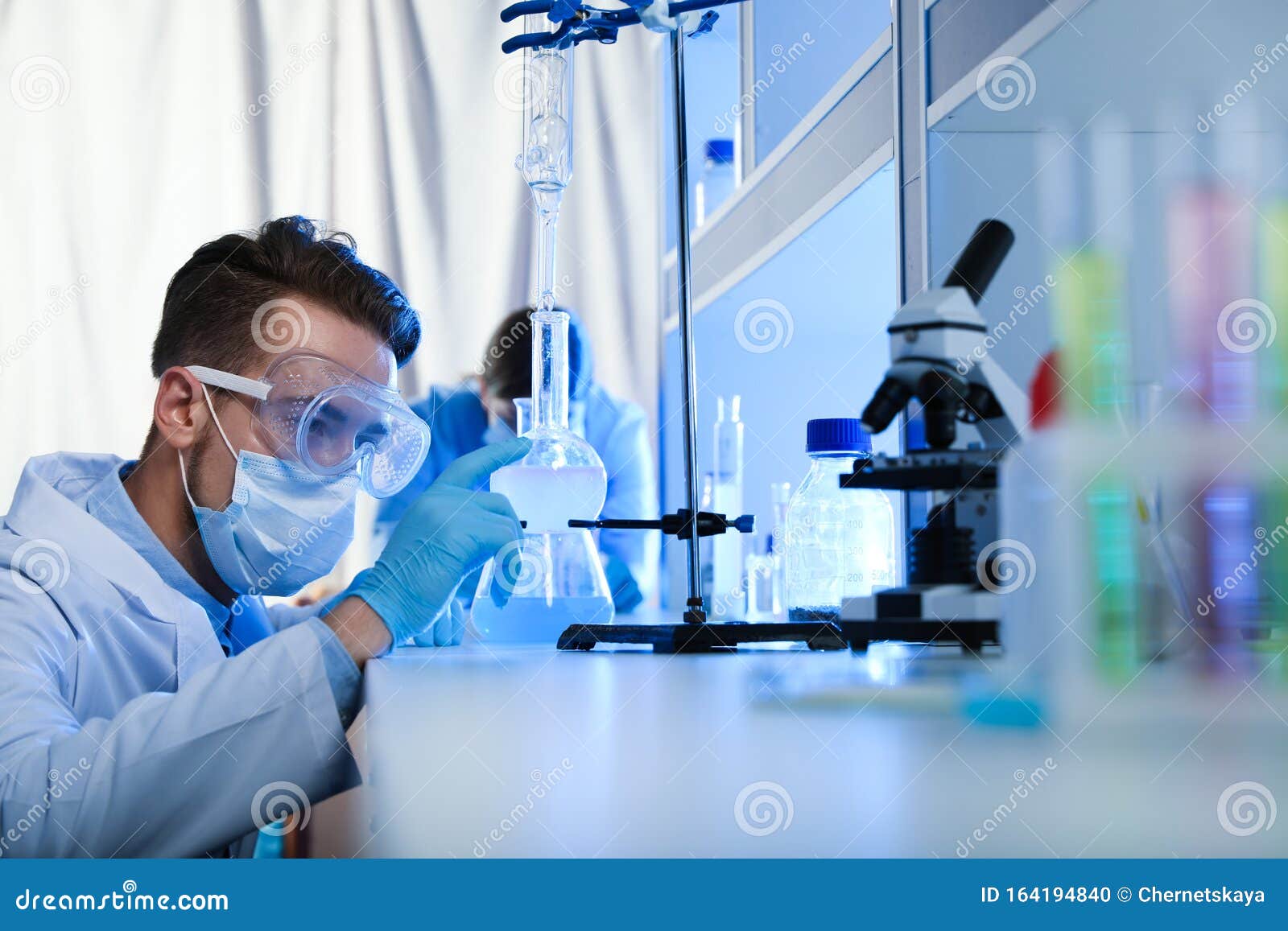 Young Scientist Doing Research and Analysis in Laboratory Stock Photo ...