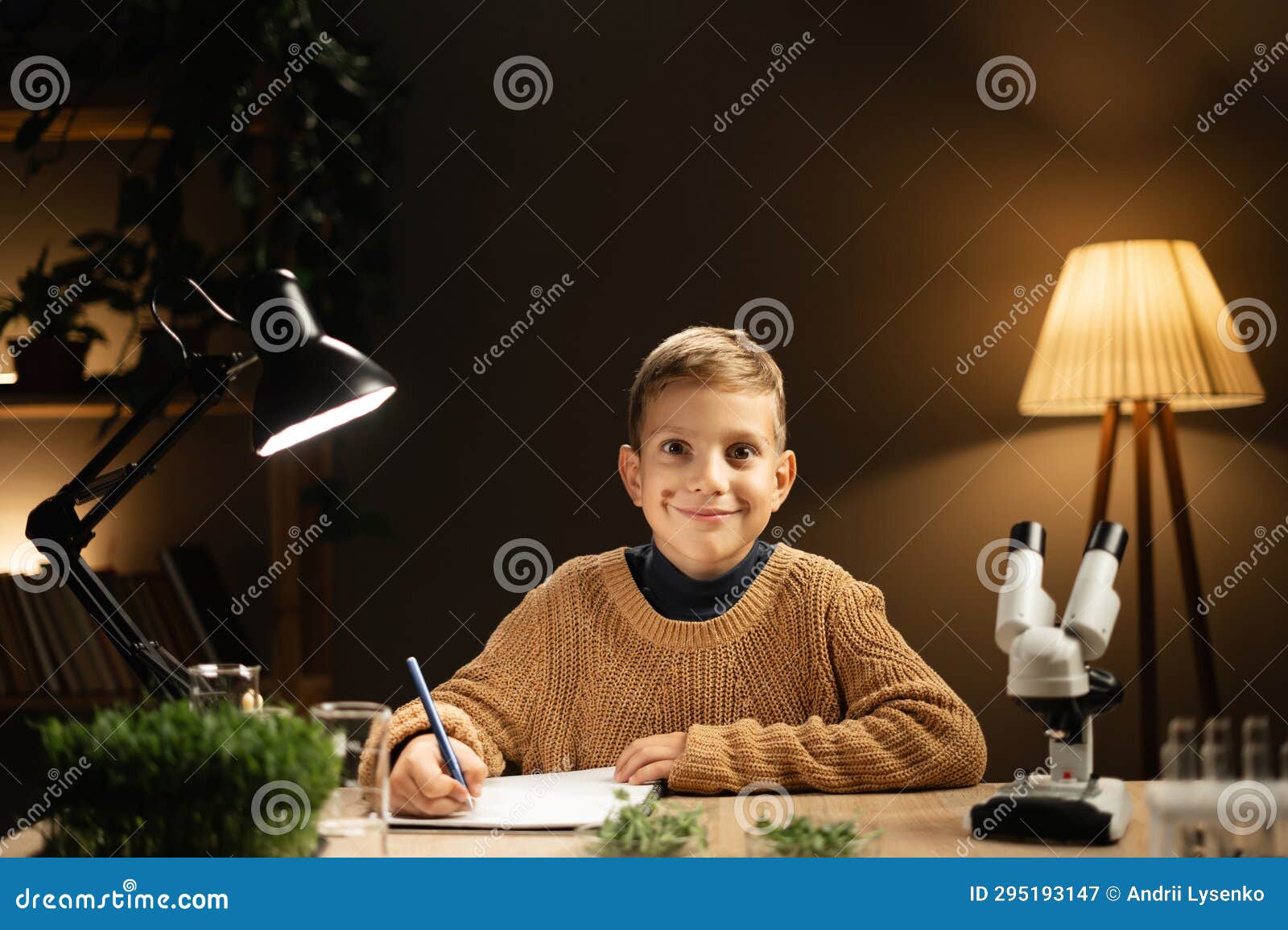 Young Scientist Doing Some Experiments with Microscope at Home ...