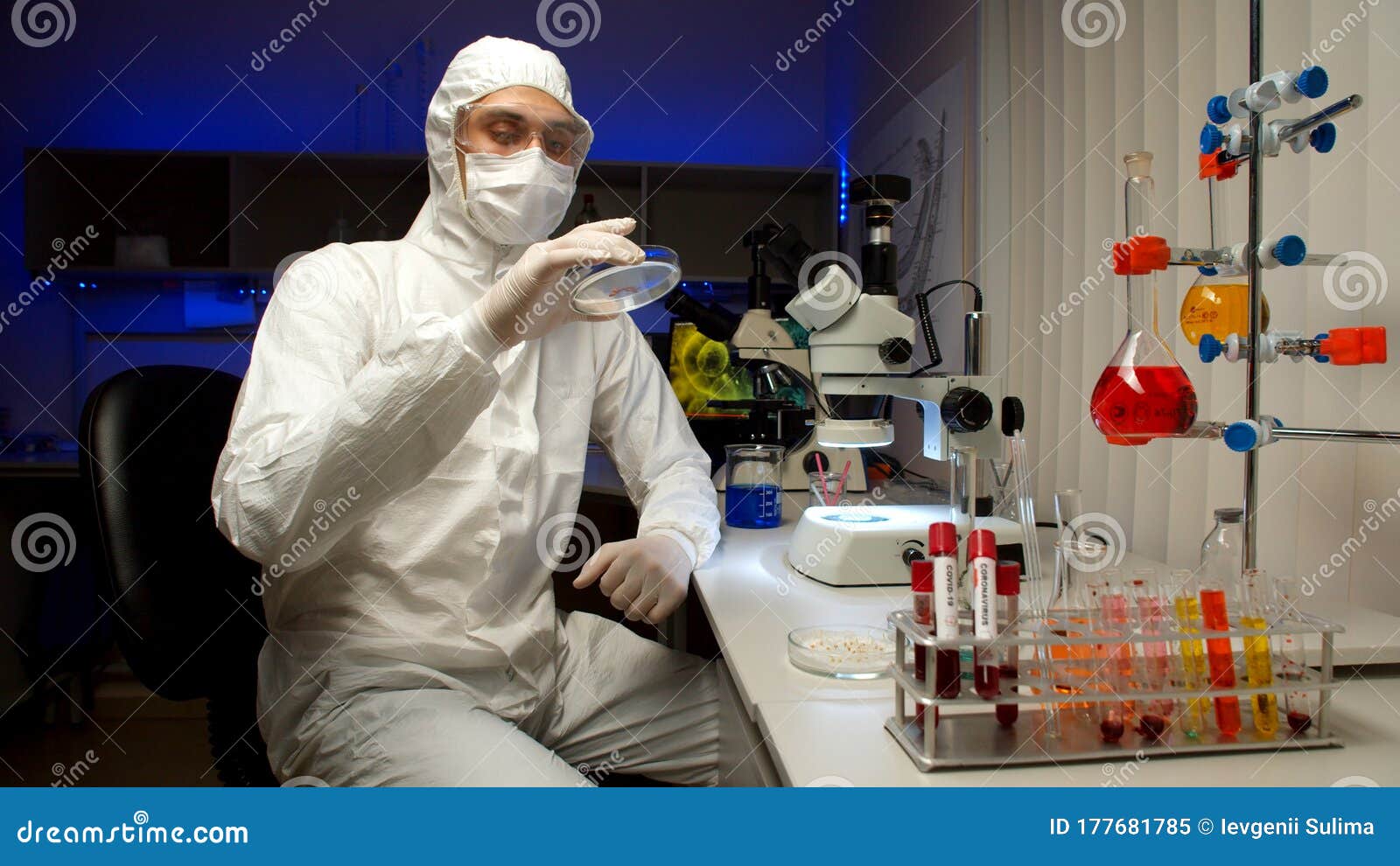 Young Scientist Examines Virus Samples with a Microscope Stock Image ...