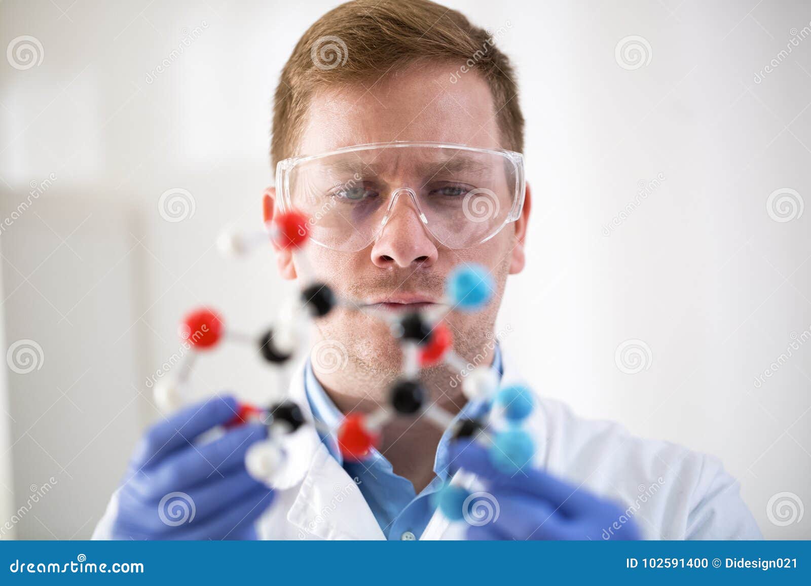 Young Scientist Holding Molecular Model at Private Clinic Stock Photo ...