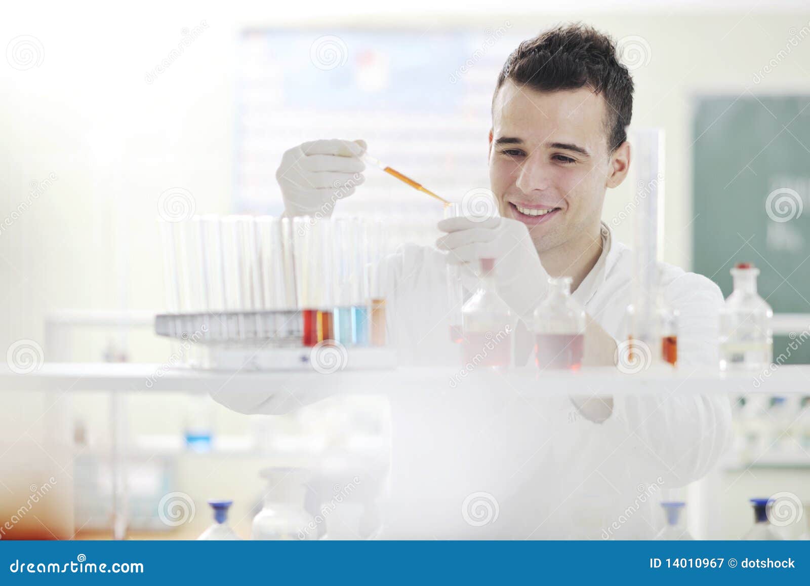 Young scientist in lab stock image. Image of liquid, biomedical - 14010967
