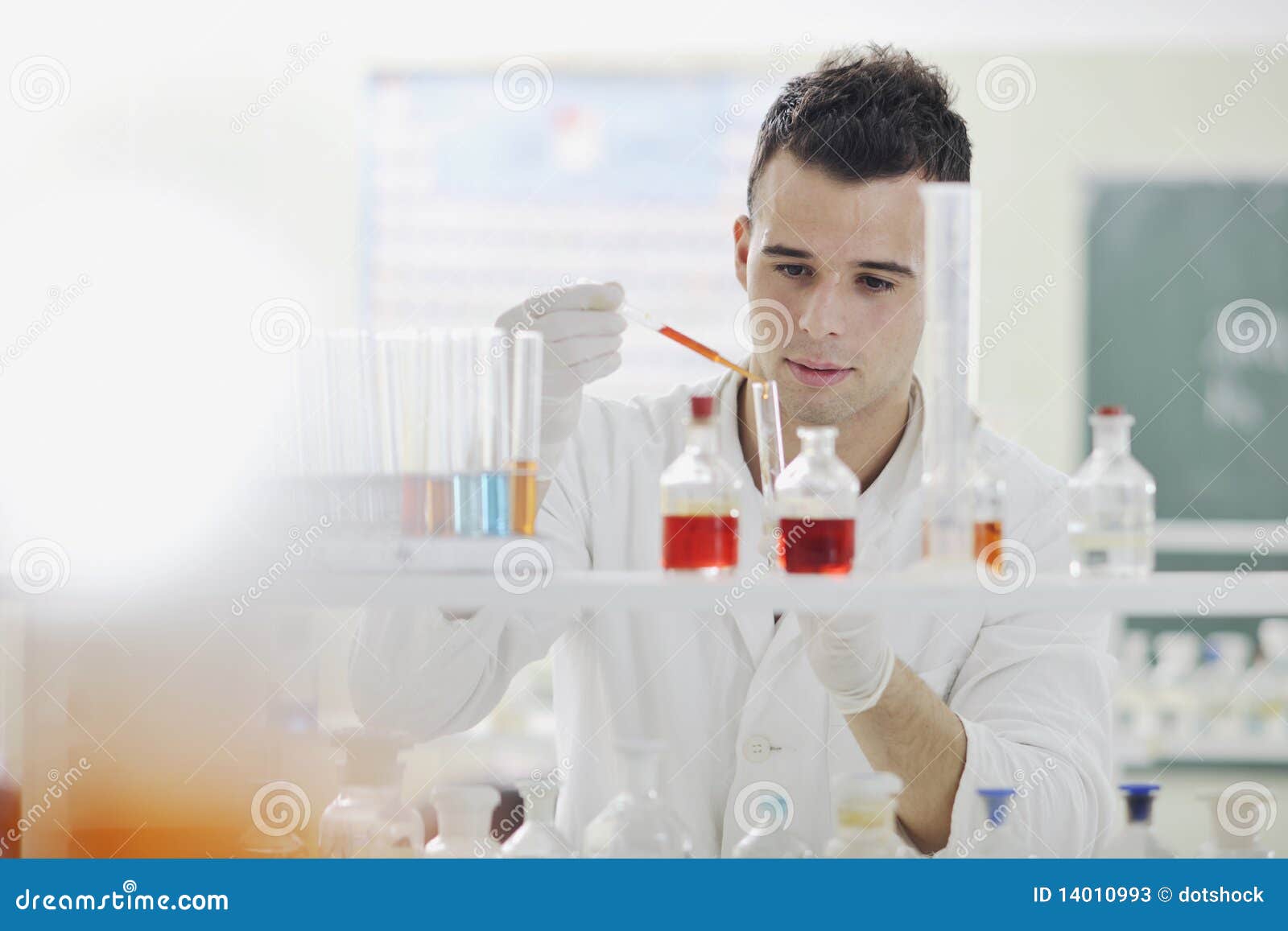 Young scientist in lab stock image. Image of healthcare - 14010993