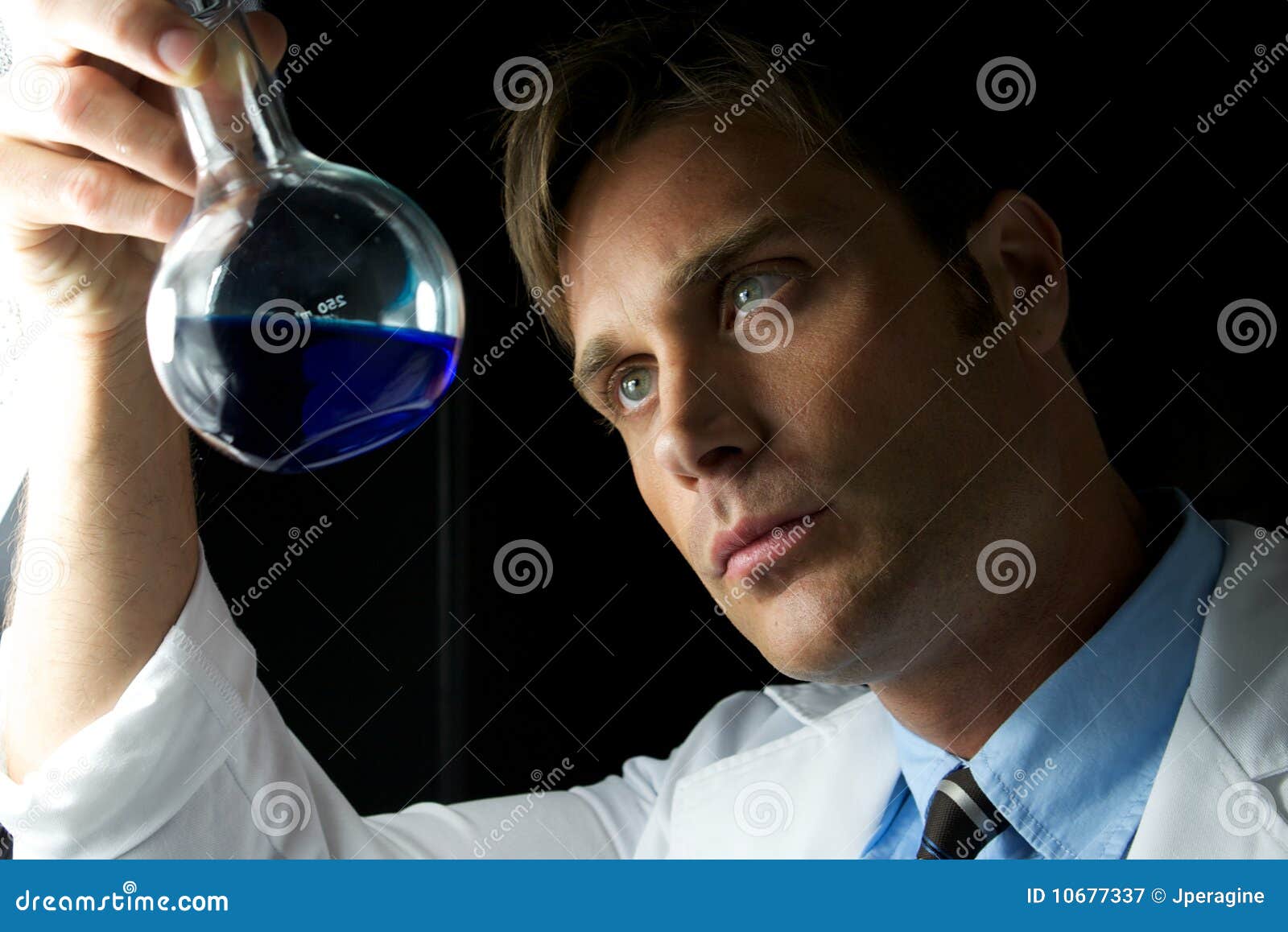 Young Scientist Performing Experiment Stock Image - Image of beaker ...