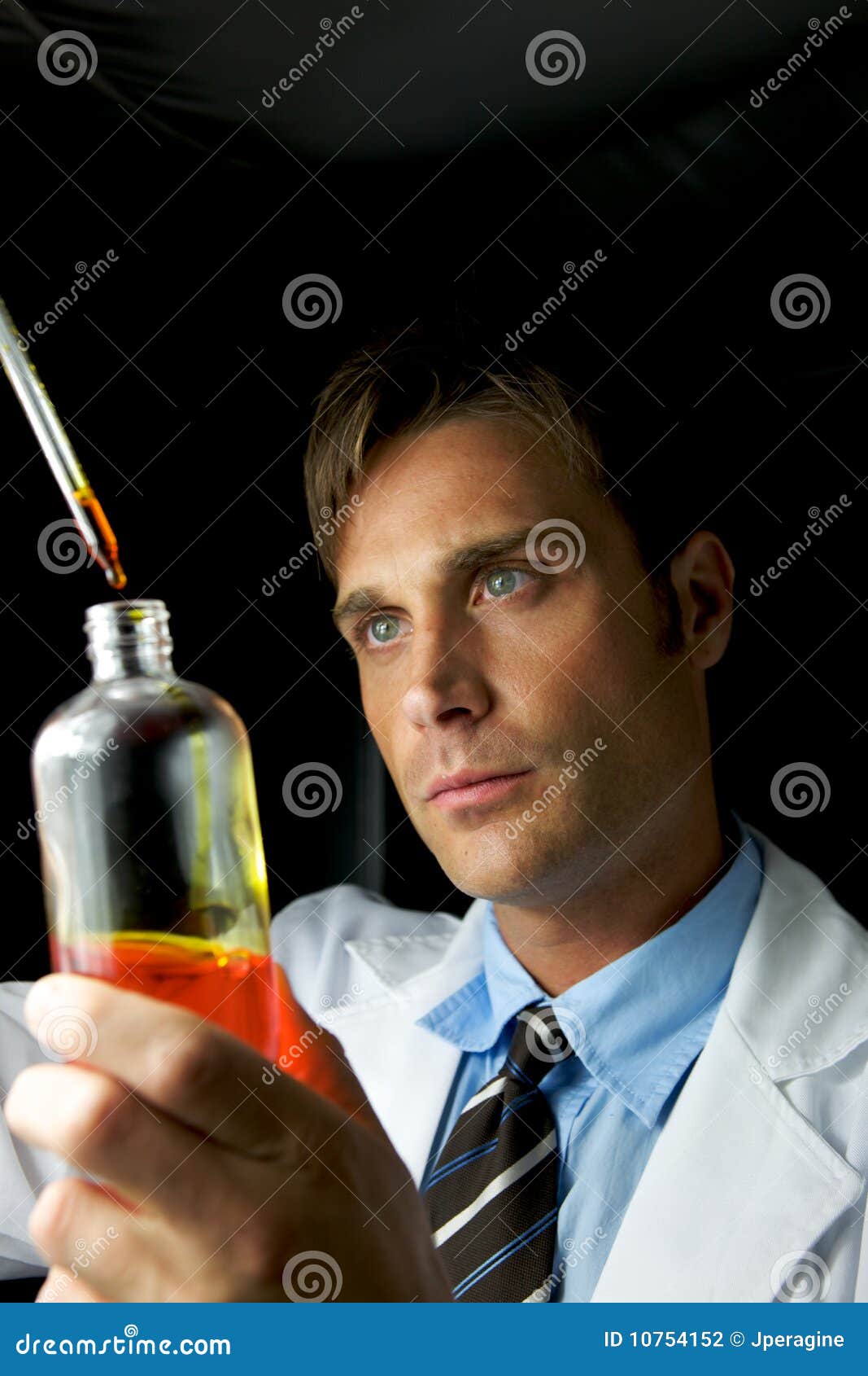 Young Scientist Performing Experiment Stock Photo - Image of medicine ...