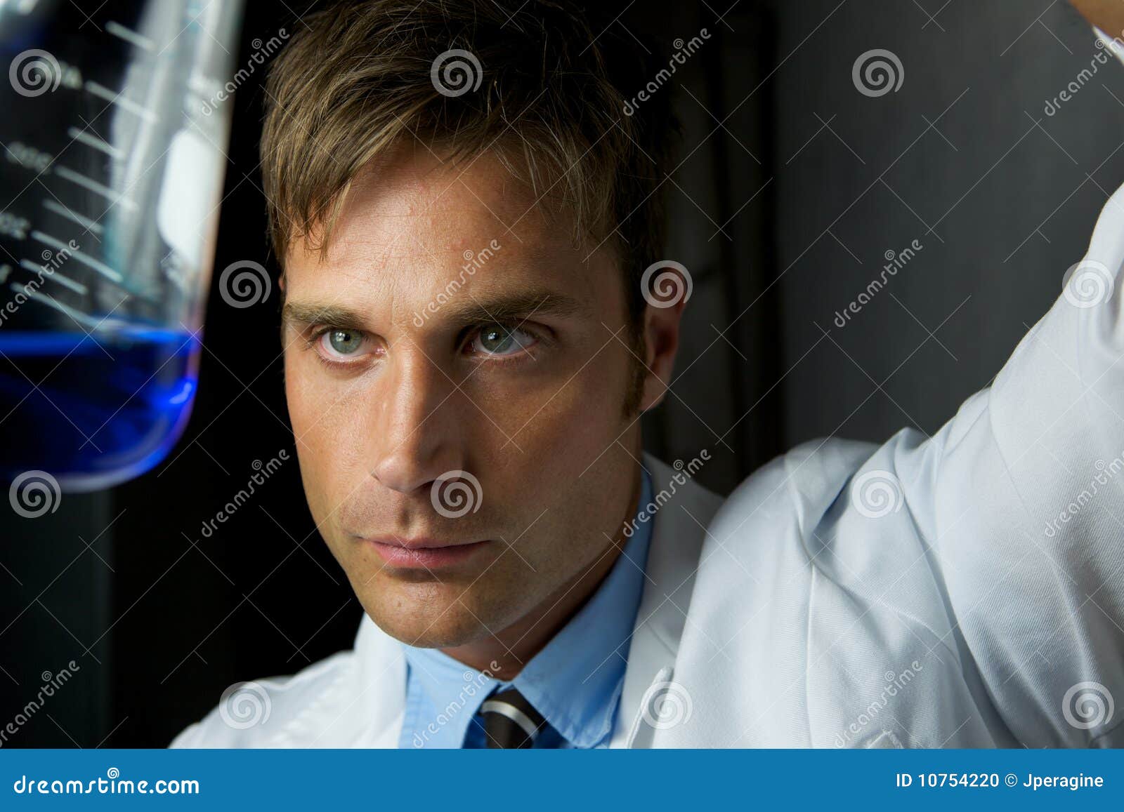 Young Scientist Performing Experiment Stock Photo - Image of copy ...
