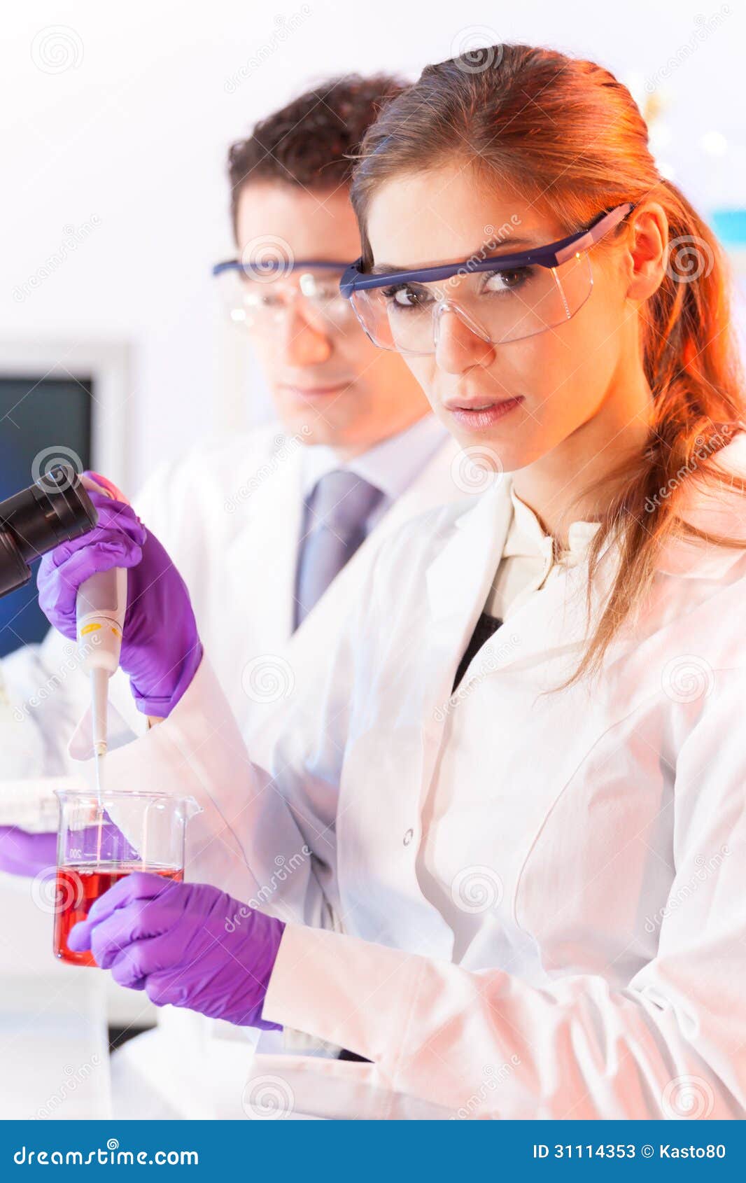 Young Scientist Pipetting Red Solution. Stock Image - Image of biology ...