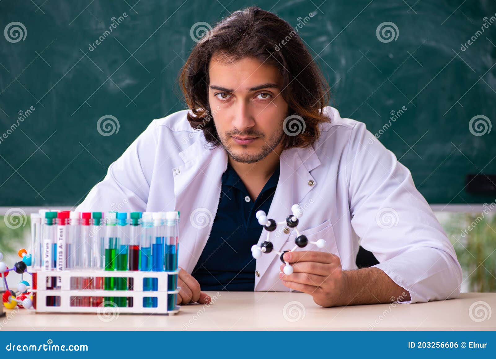 Young Male Scientist Sitting in the Classroom Stock Photo - Image of ...