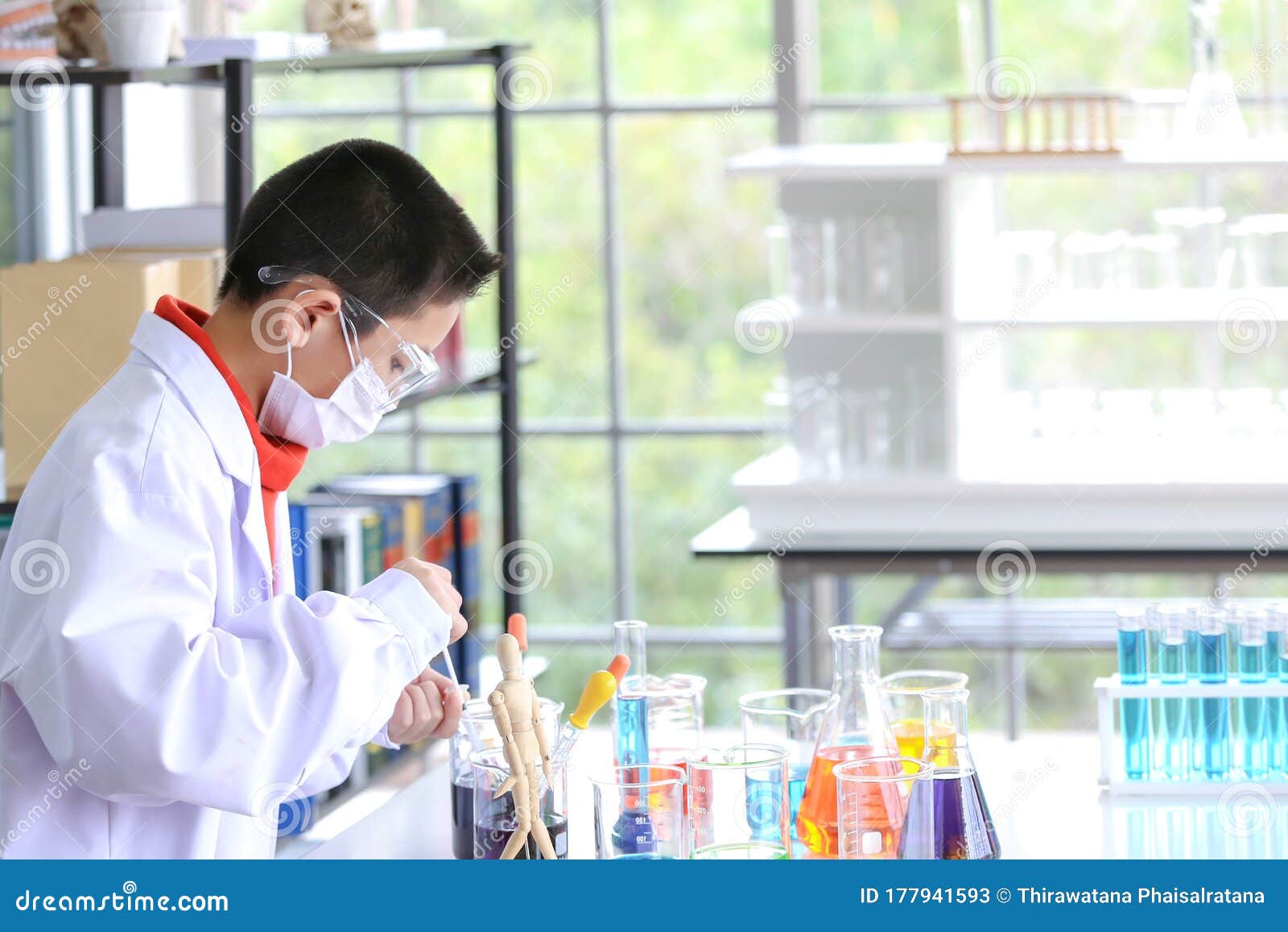 The Young Scientist is Standing in Front of His Own Experiment in the ...