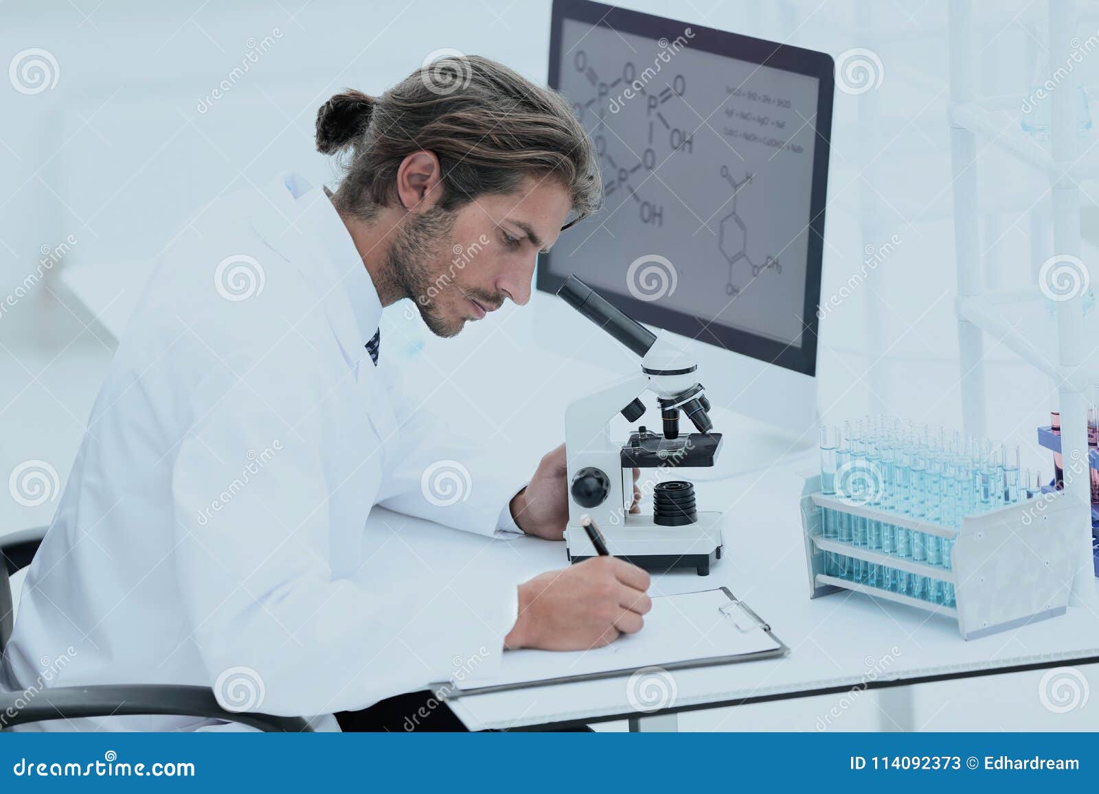 Laboratory Worker Sitting by Table with Microscope Stock Image - Image ...