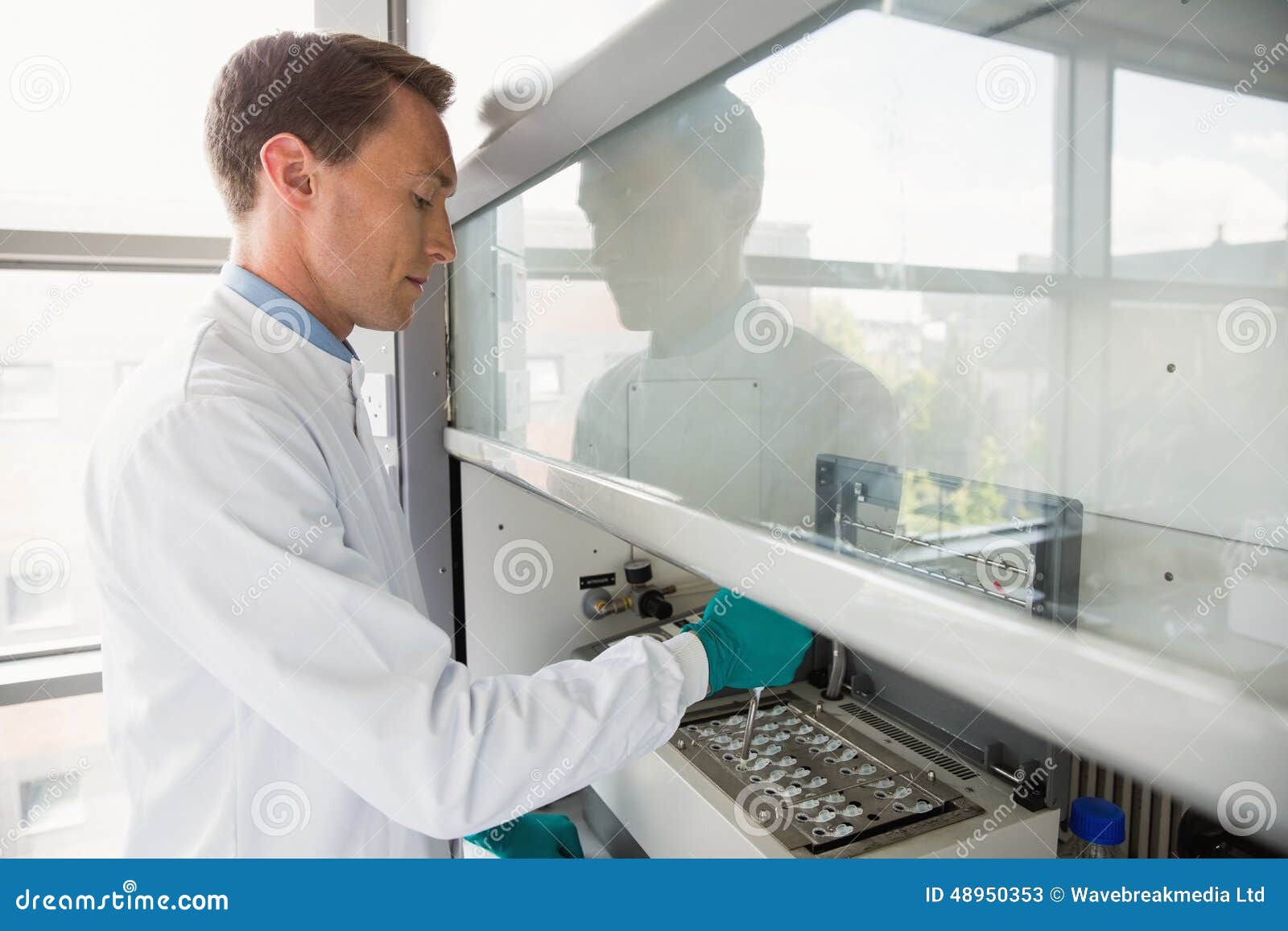 Young Scientist Using a Pipette in Chamber Stock Image - Image of male ...