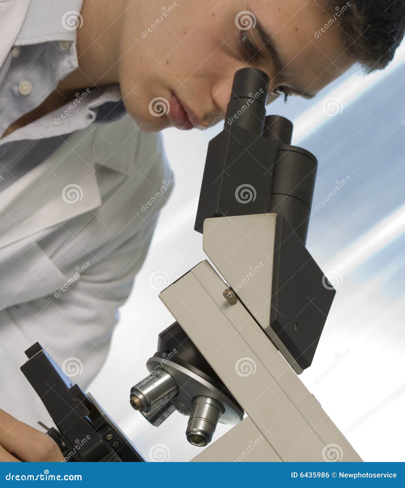 Young Scientist Watching Inside a Microscope Stock Photo - Image of ...