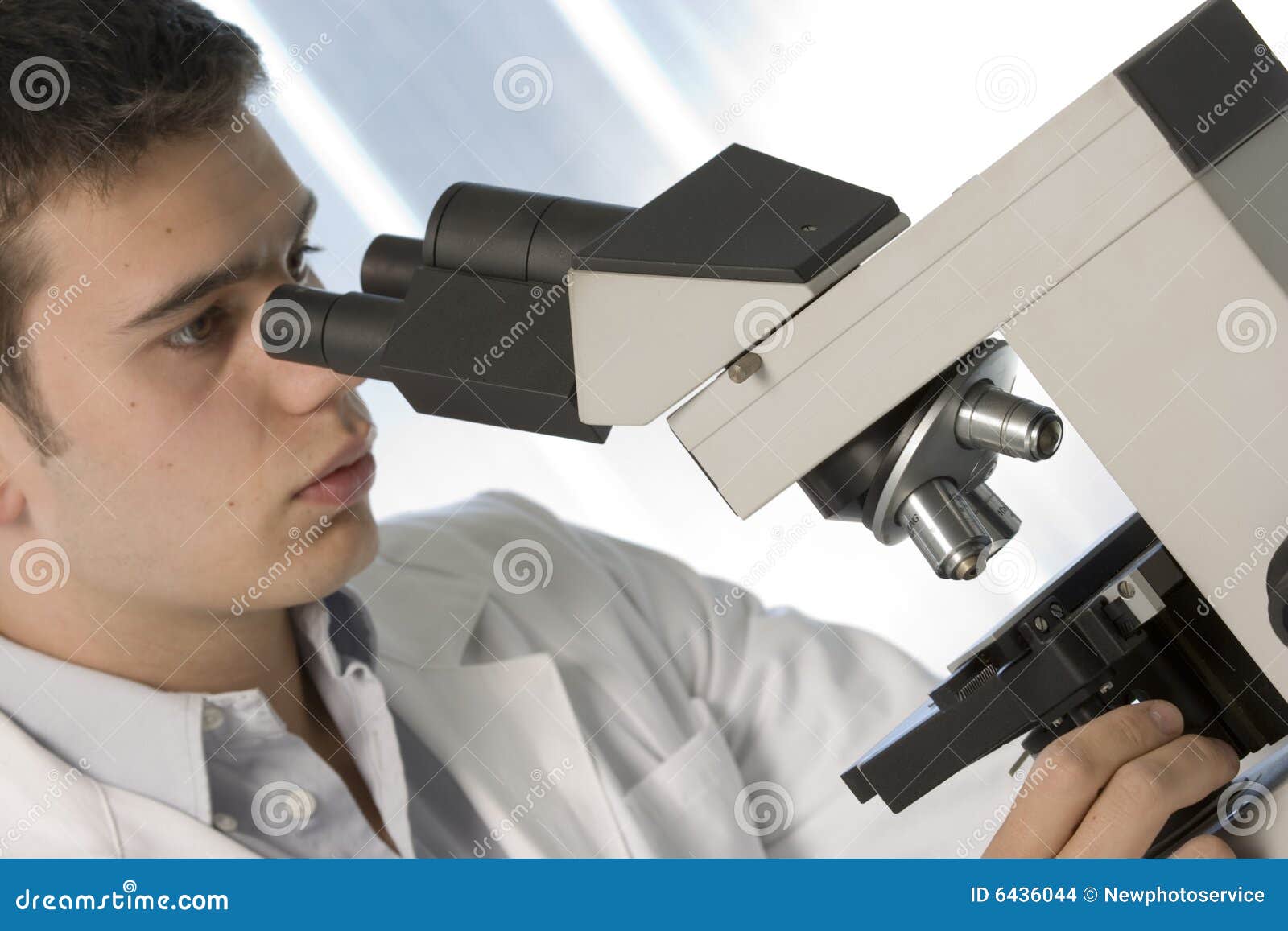 Young Scientist Watching Inside a Microscope Stock Photo - Image of ...