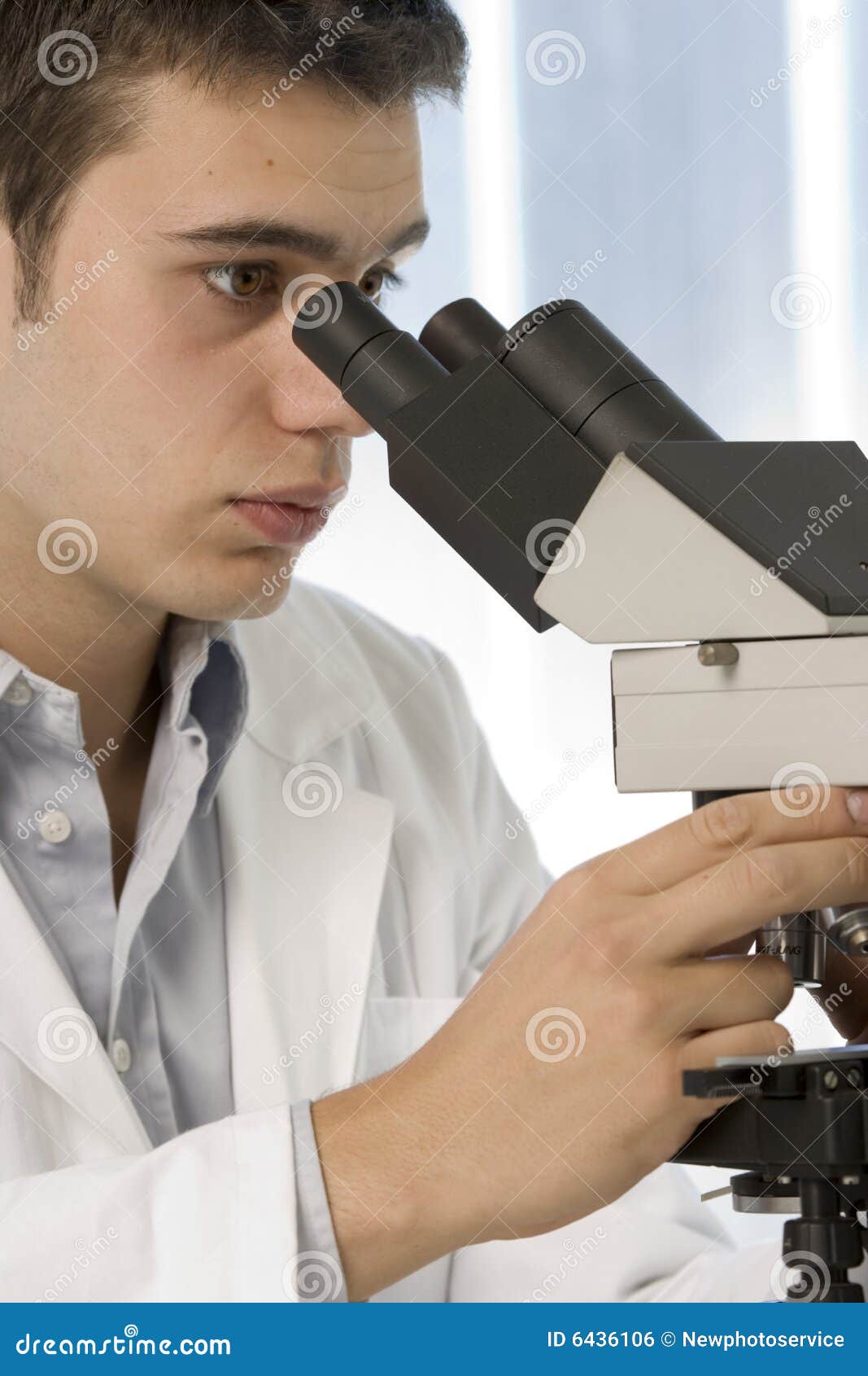 Young Scientist Watching Inside a Microscope Stock Photo - Image of ...