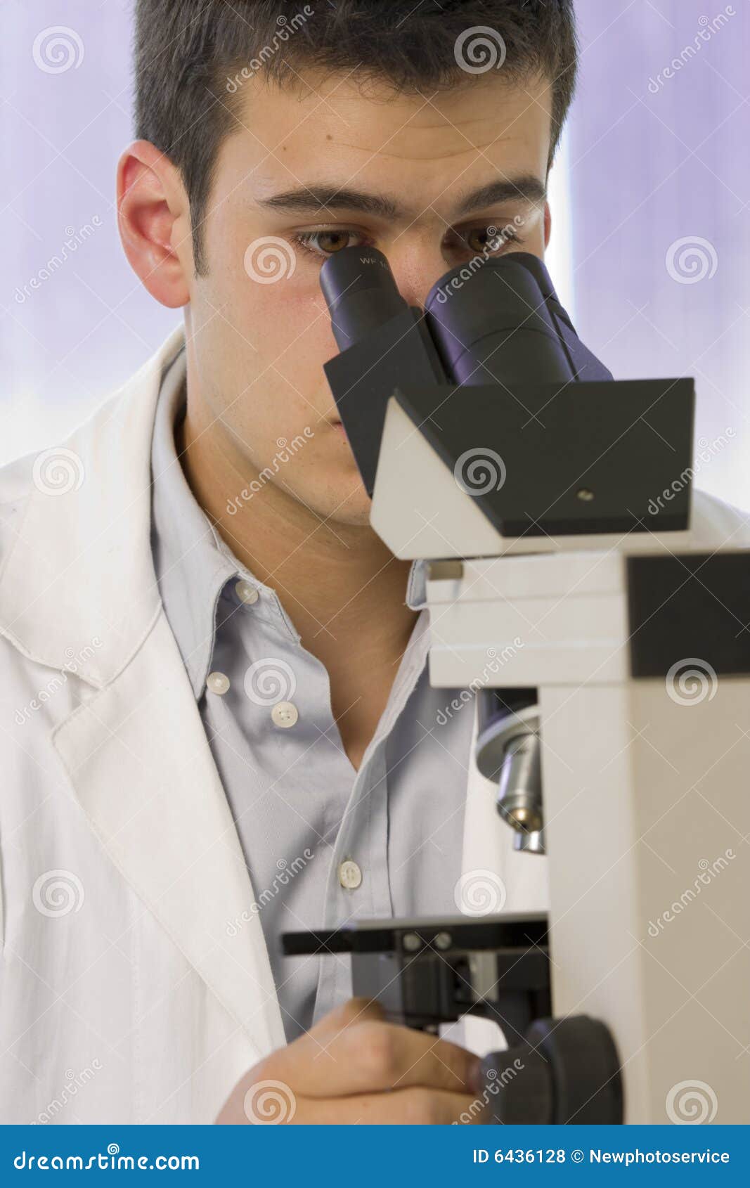 Young Scientist Watching Inside a Microscope Stock Photo - Image of ...