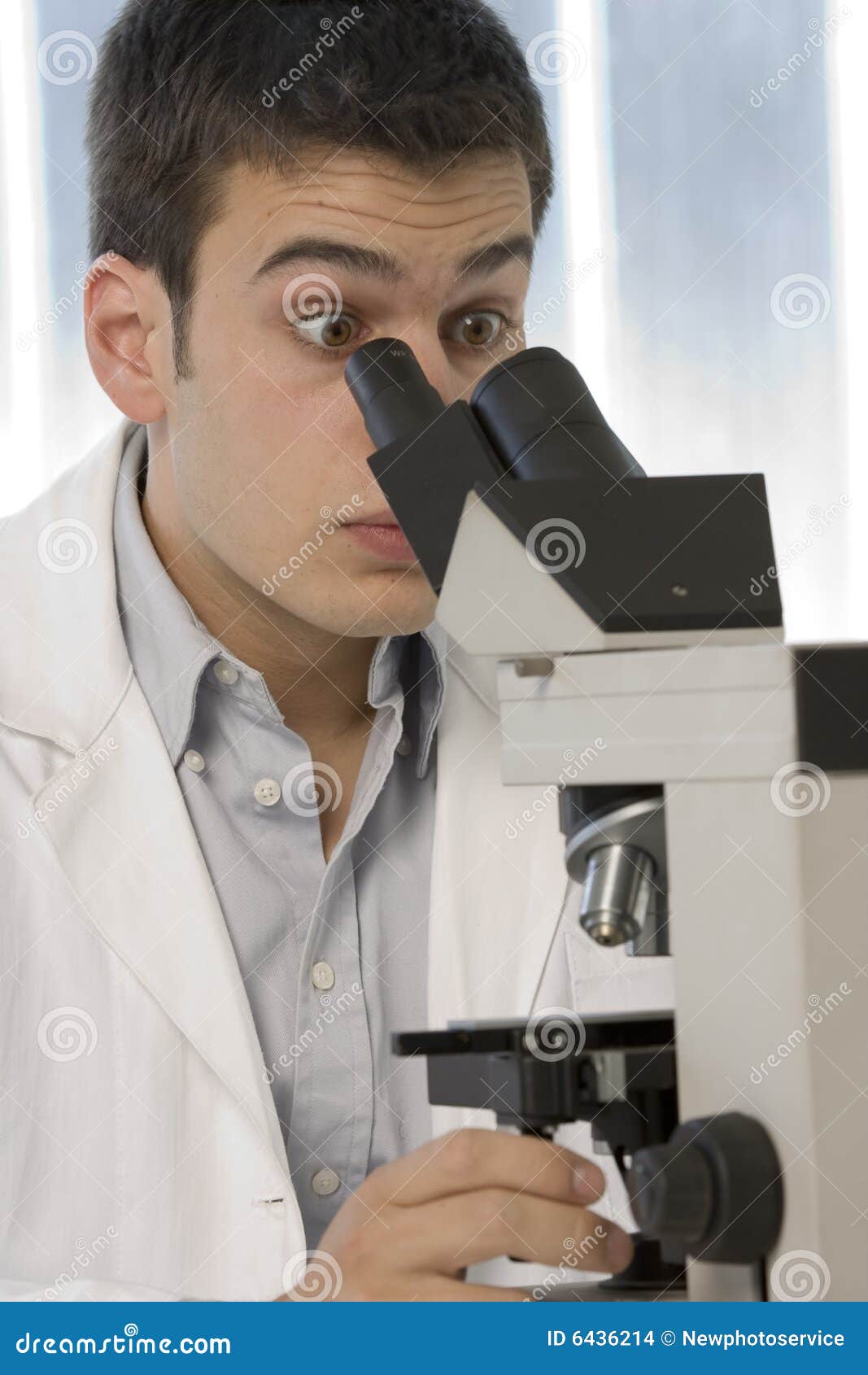 Young Scientist Watching Inside a Microscope Stock Photo - Image of ...