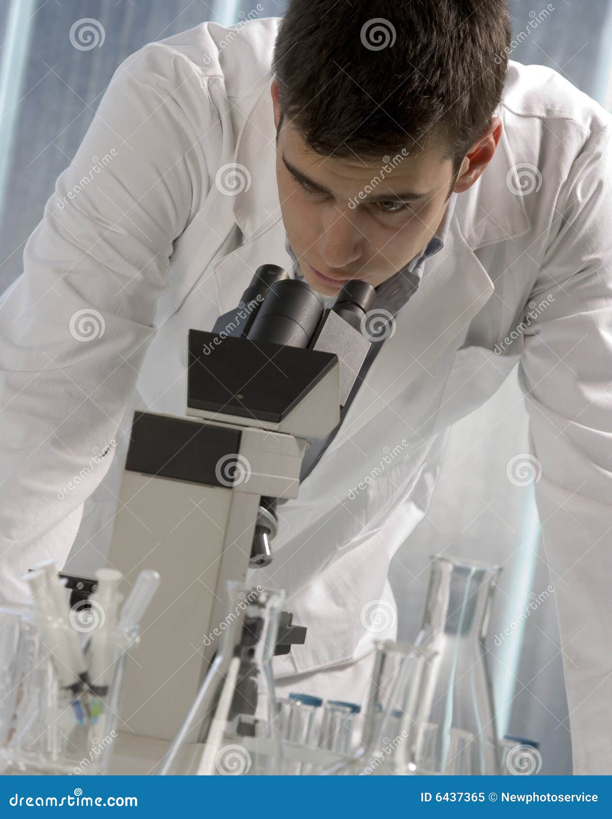 Young Scientist Watching Inside a Microscope Stock Image - Image of ...