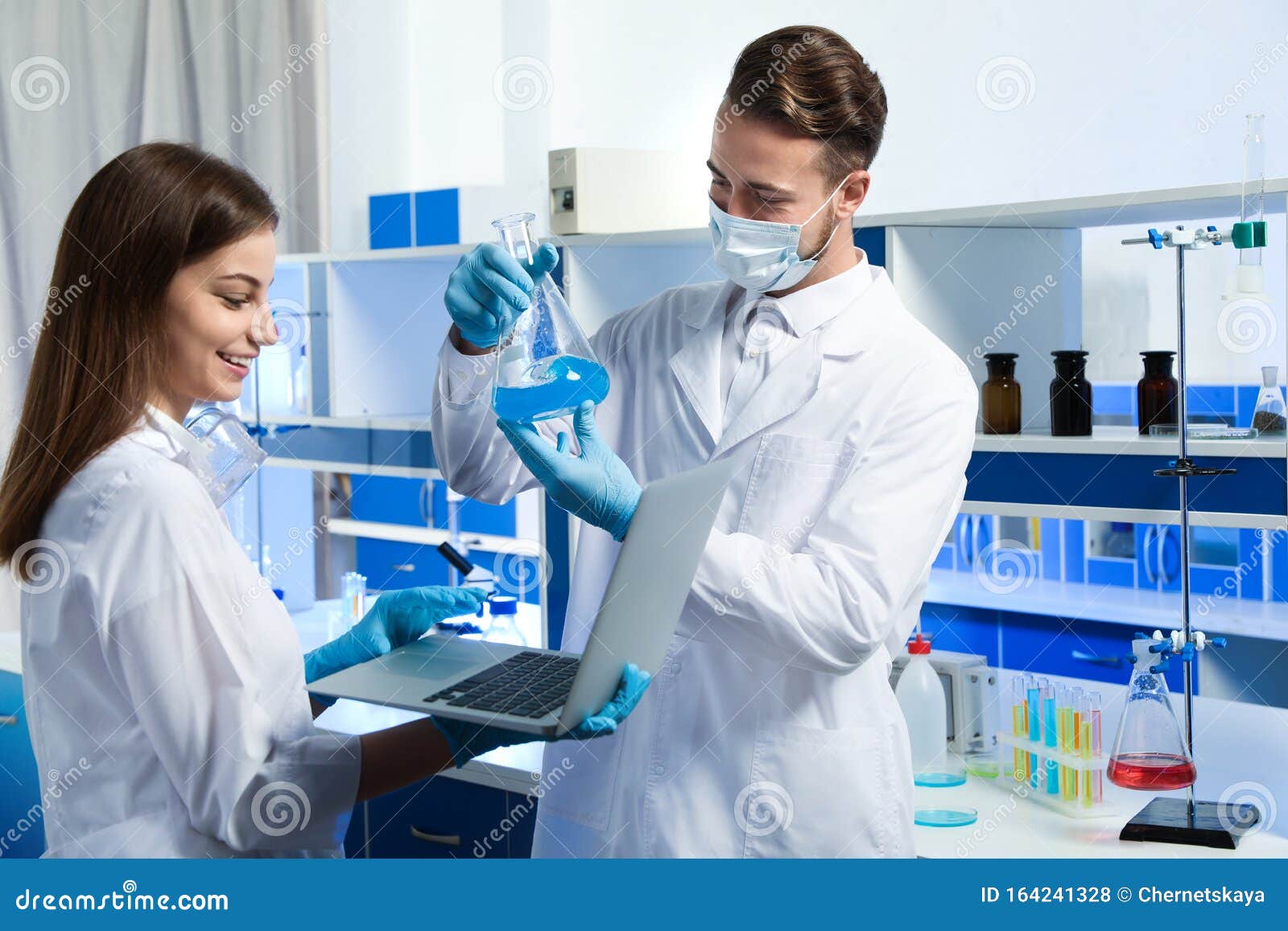 Young Scientists Doing Research and Analysis in Laboratory Stock Photo ...