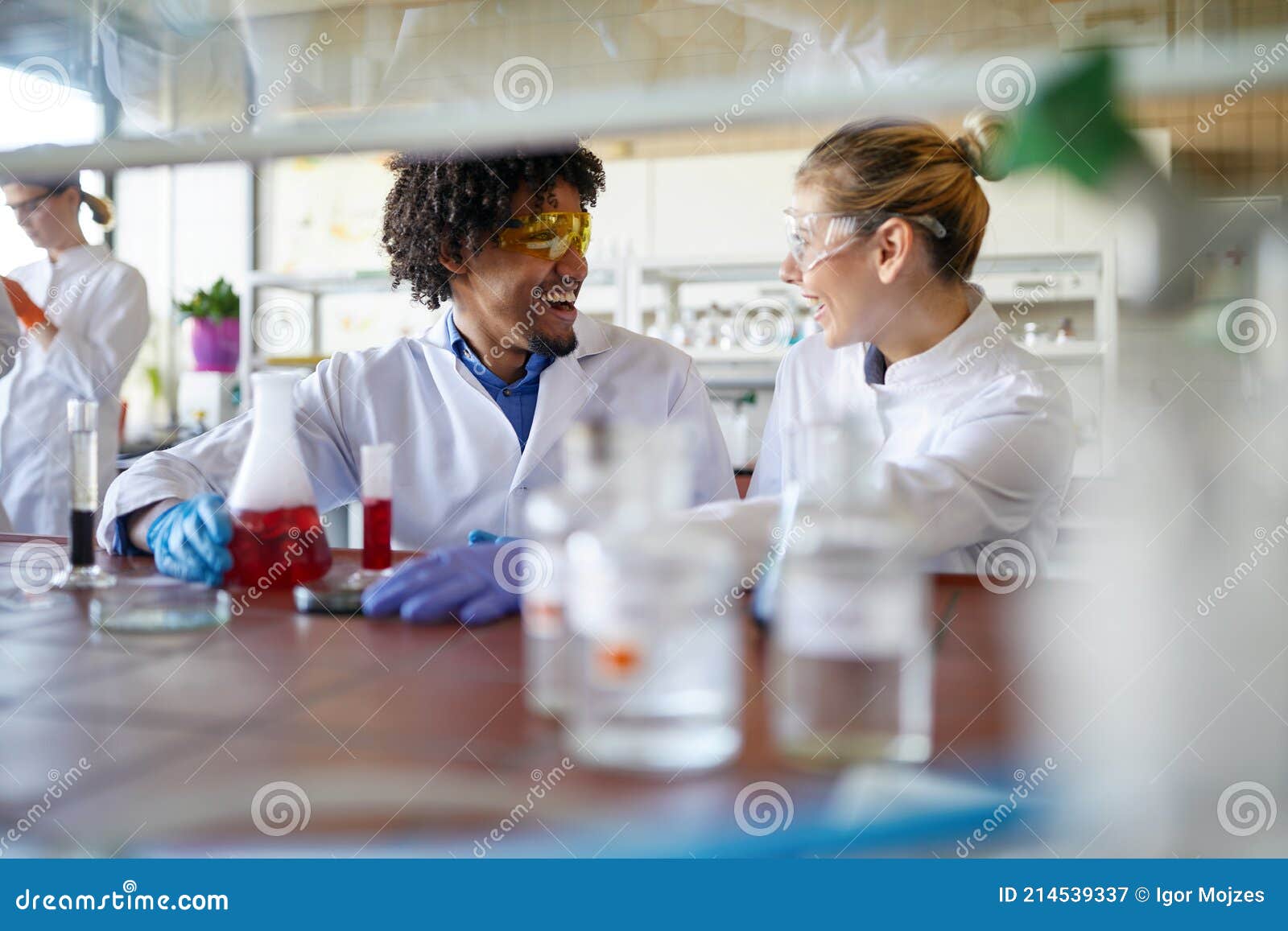 Young Scientists Enjoy while Work in the Laboratory. Science, Chemistry ...