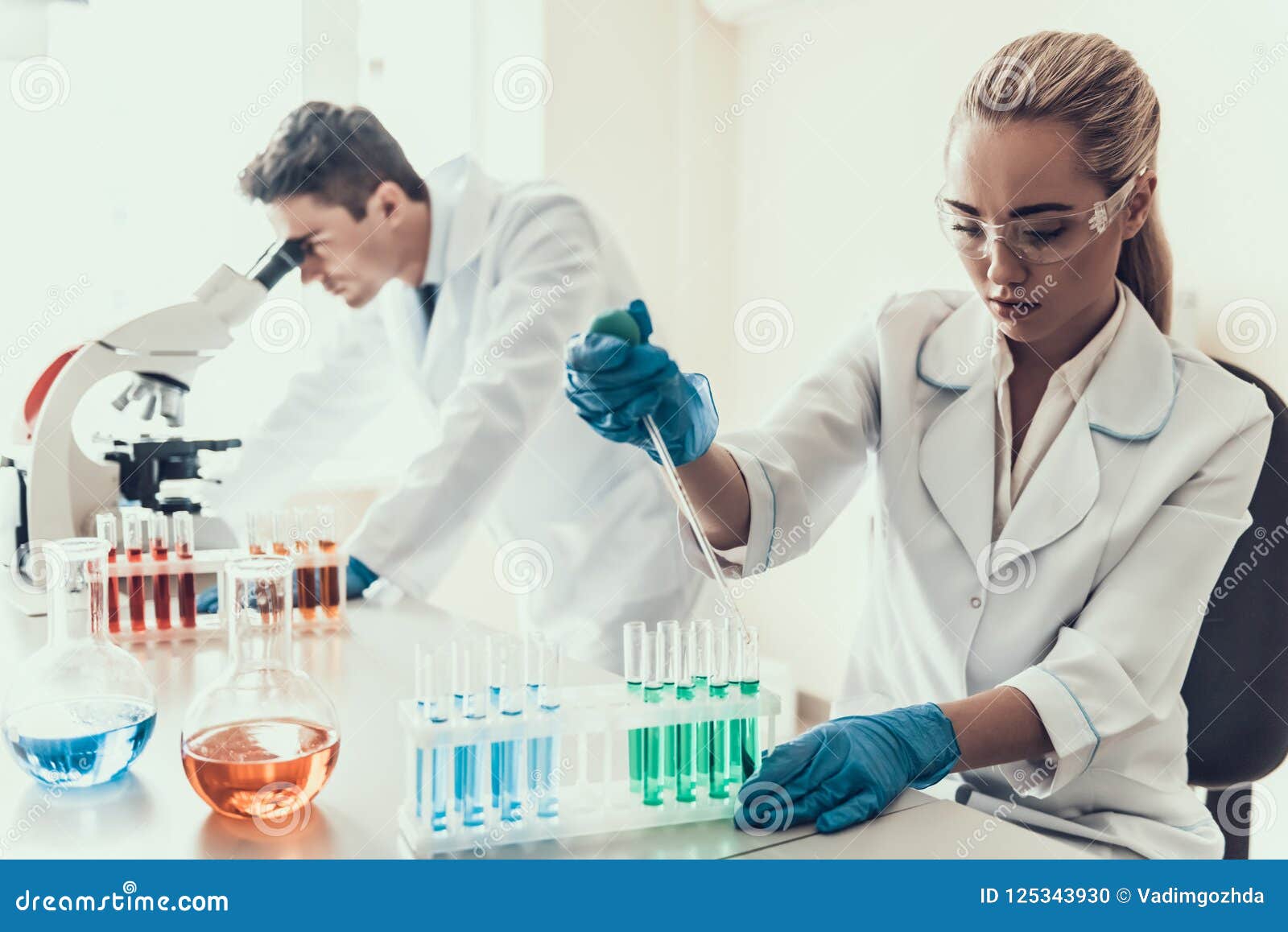 Young Scientists Examining Samples in Laboratory Stock Photo - Image of ...