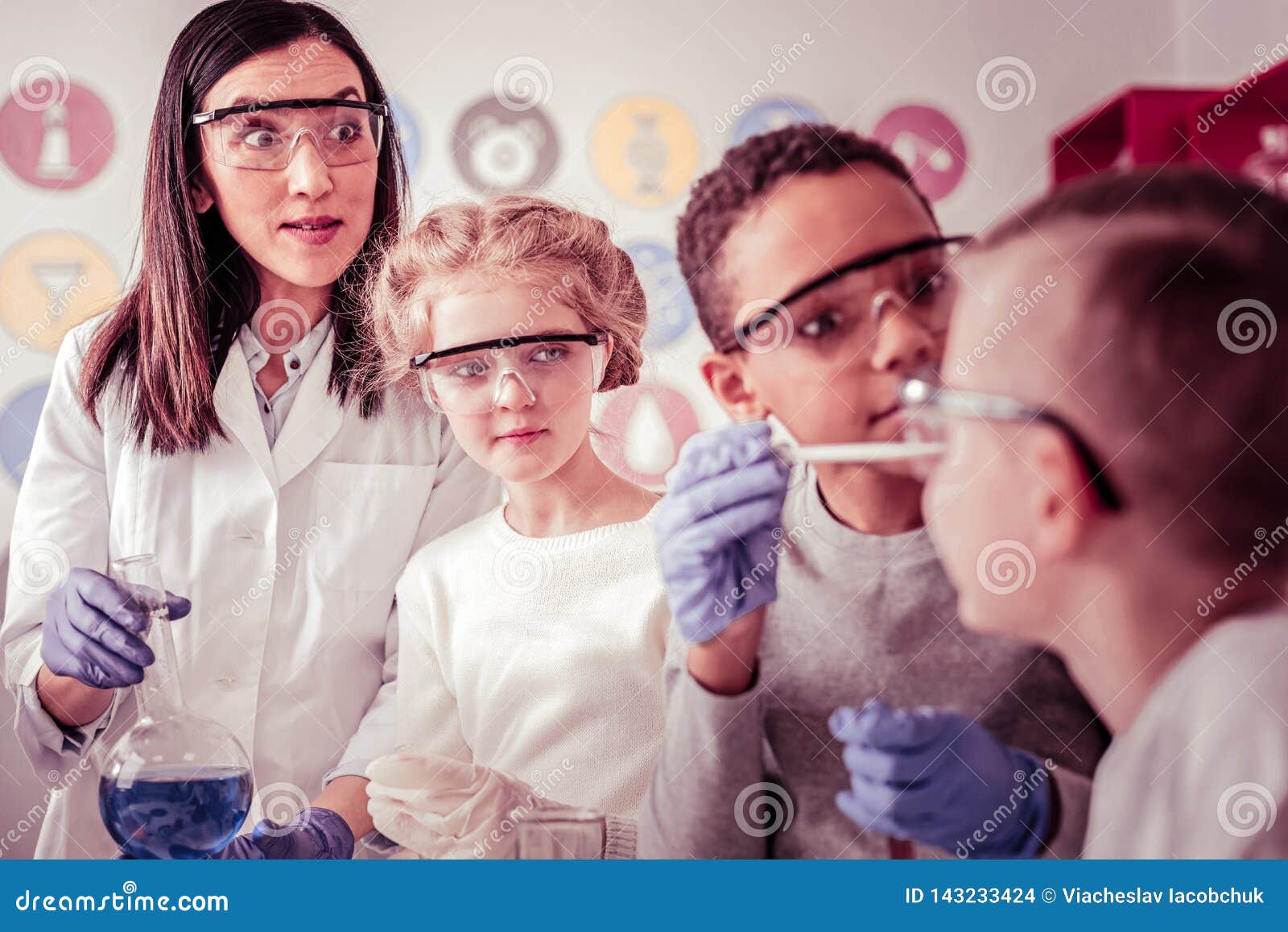 Elementary School Group Looking Surprised on Their Classmate Stock ...