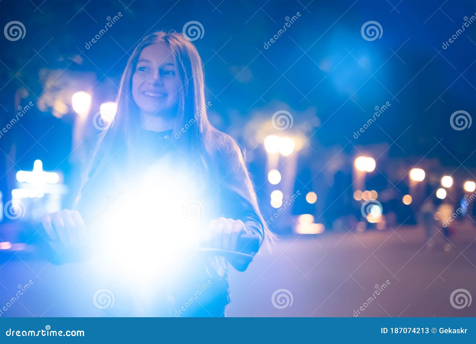 Scooter girl at night stock image. Image of city, electrical - 187074213