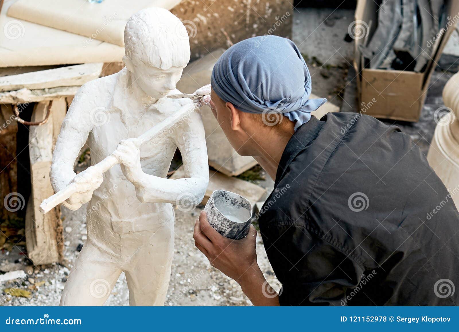 A Young Sculptor Makes a Sculpture of White Plaster. Editorial Stock ...