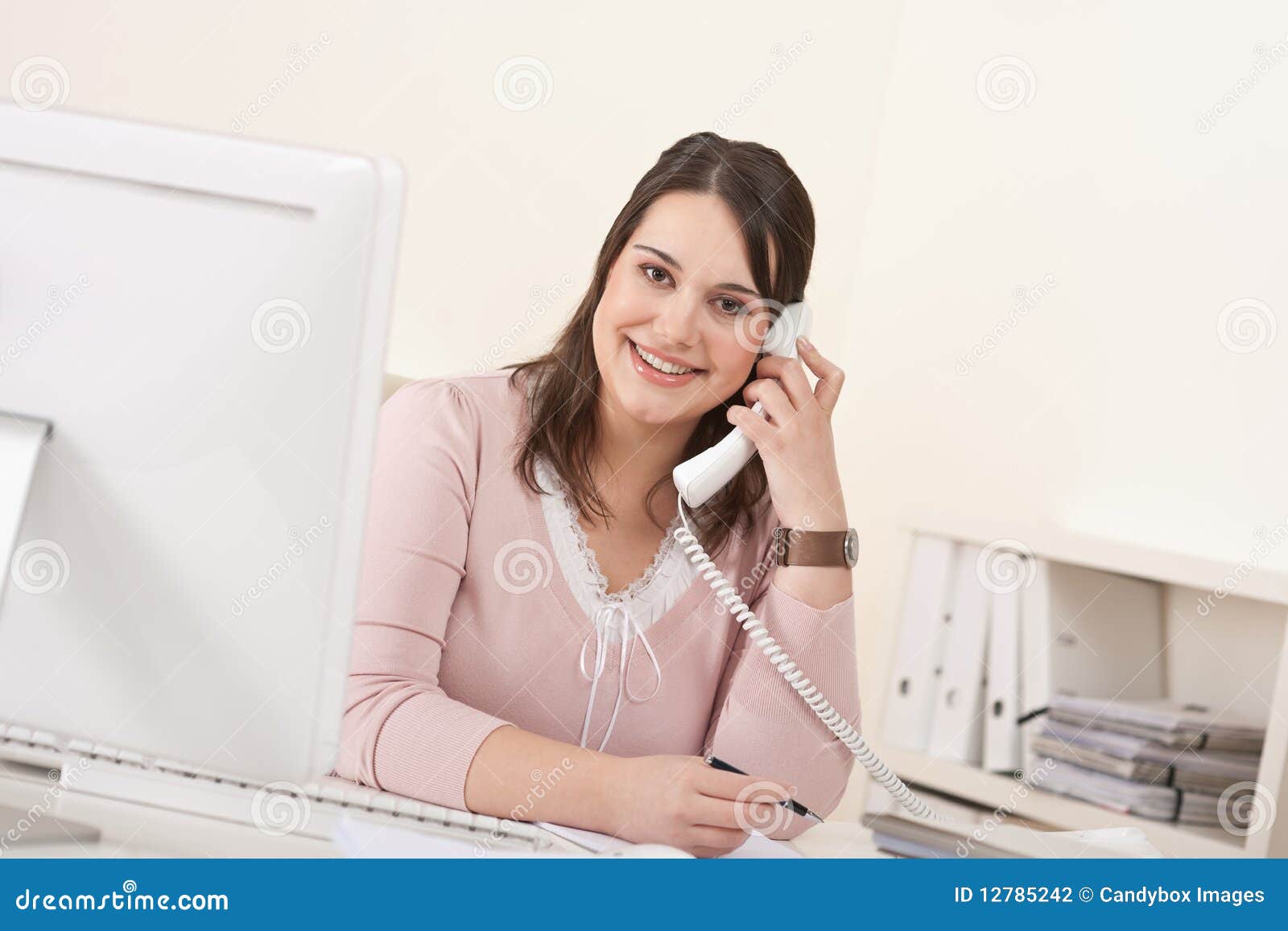Young Secretary on Phone at Modern Office Stock Photo - Image of adult ...