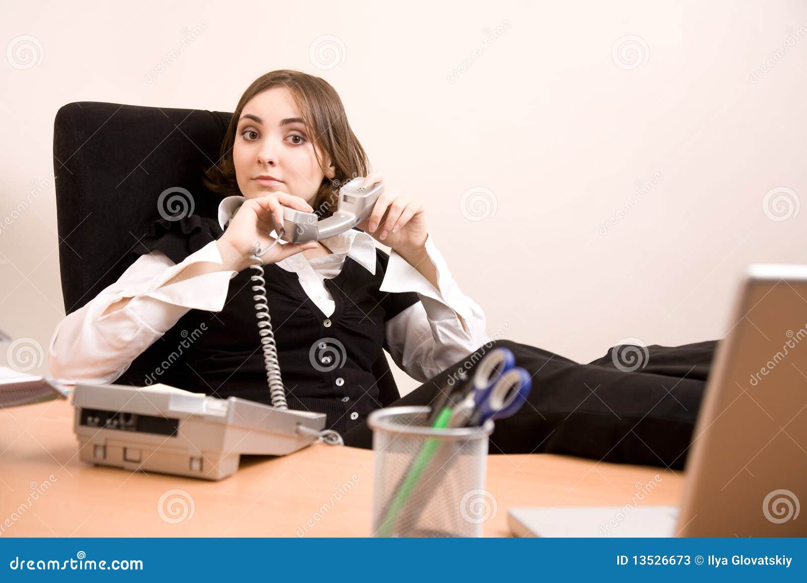 Young Secretary with Telephone and Laptop Stock Image - Image of girl ...