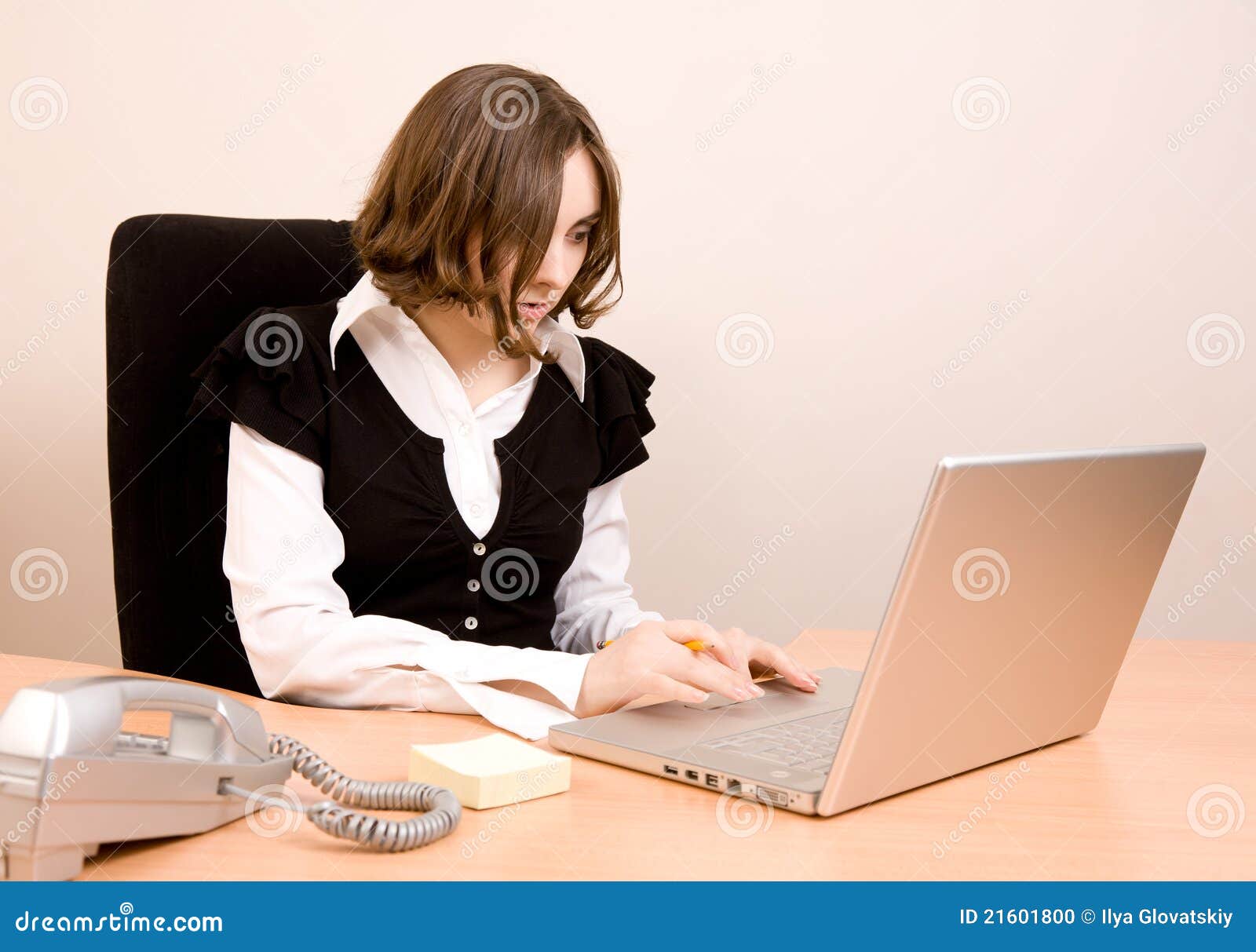 Young Secretary with Telephone and Laptop Stock Photo - Image of boss ...