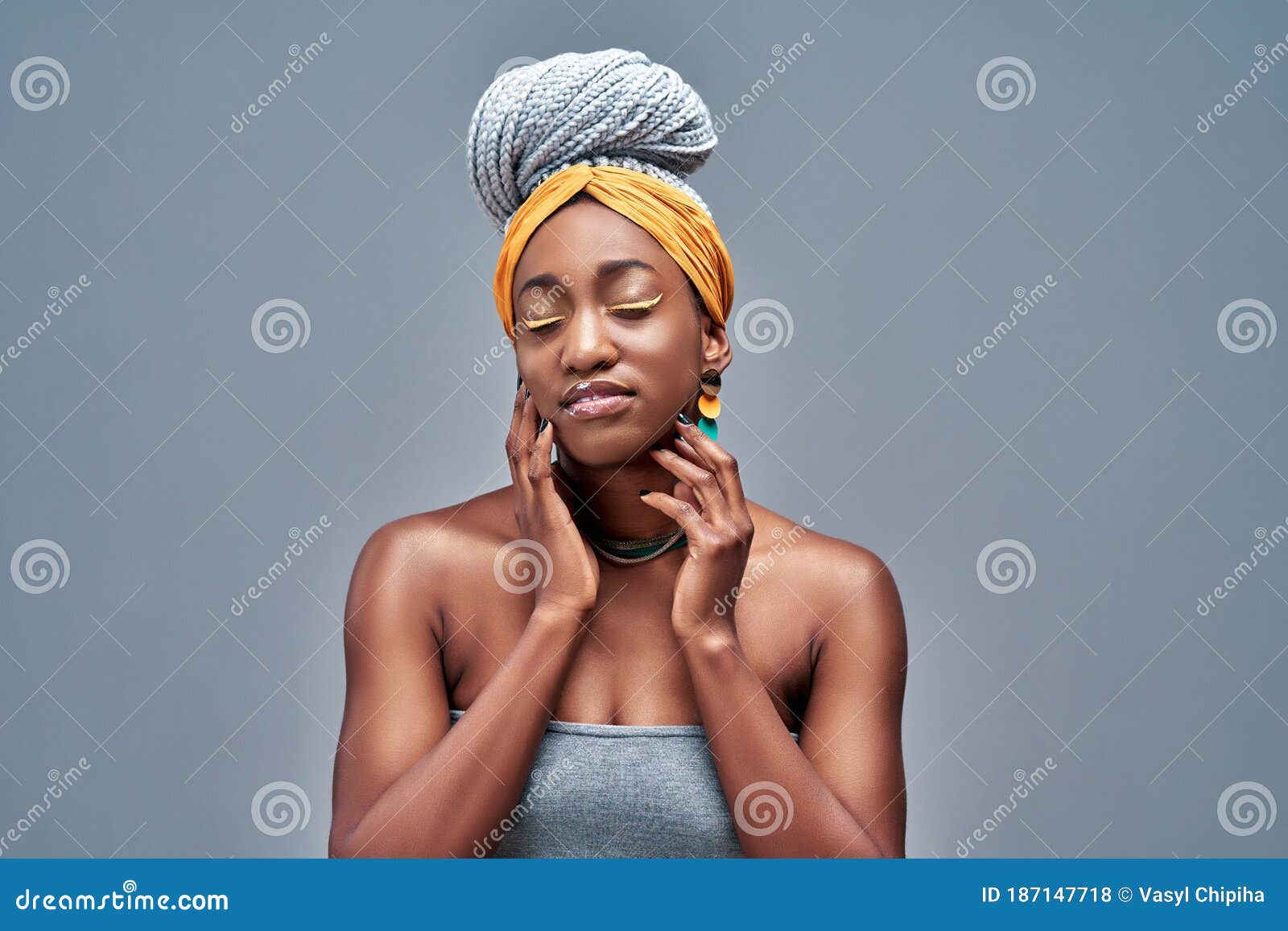 Young Sensual African American Woman With Artistic Make Up Tenderly