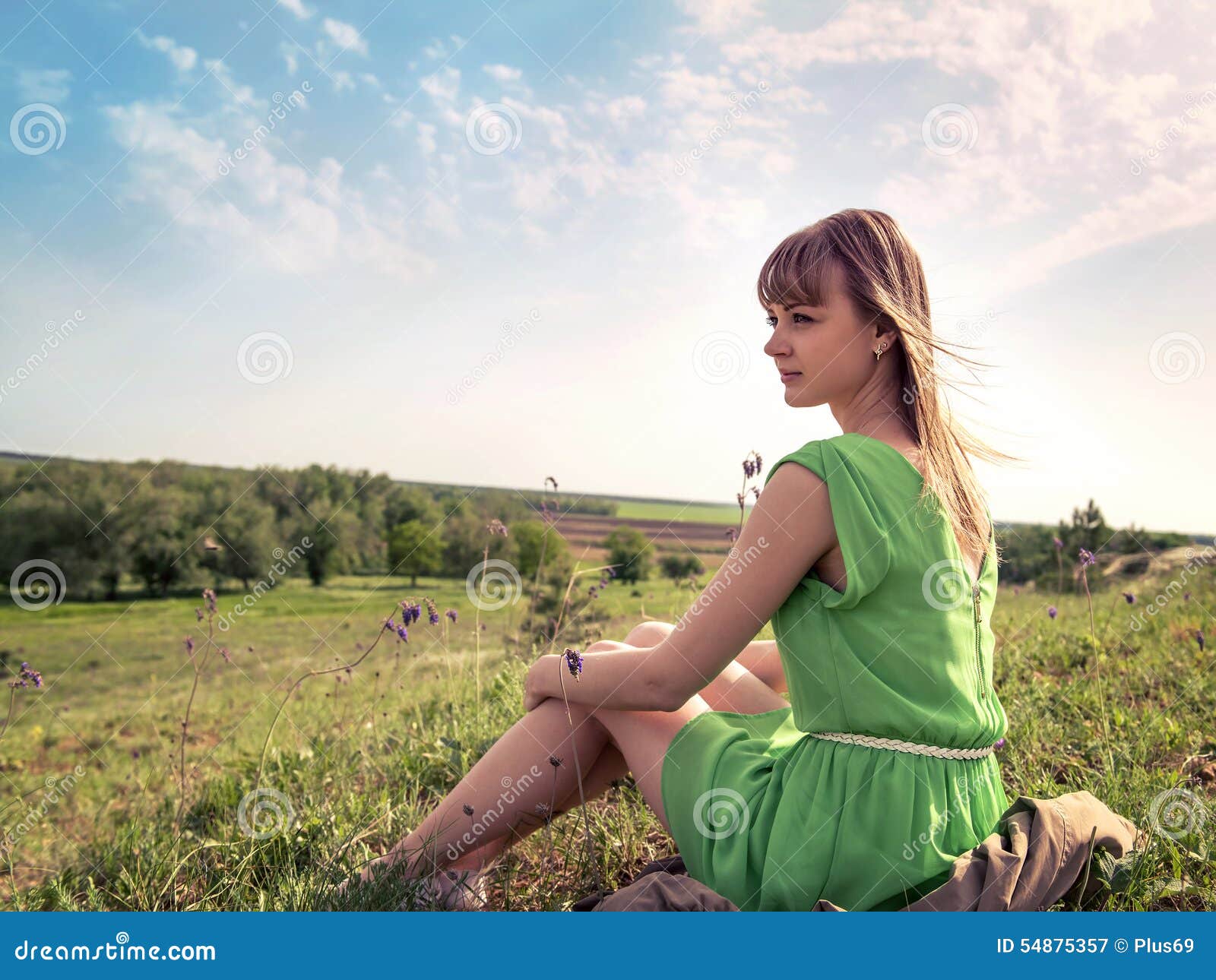 Young Sensual Girl Sits in a Grass Outdoors Stock Image - Image of cute, smile: 54875357
