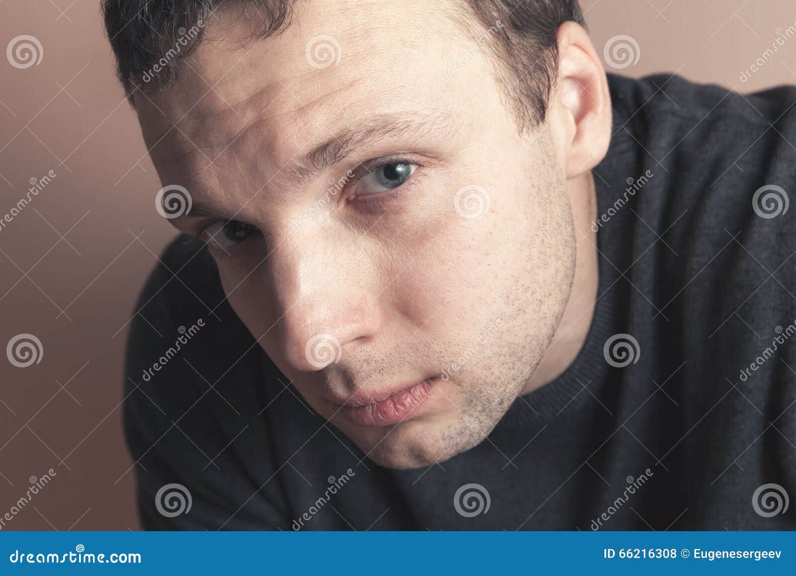 Young Serious Caucasian Man, Closeup Studio Portrait Stock Photo ... Young Serious Caucasian Man, Closeup Studio Portrait Stock Photo ...