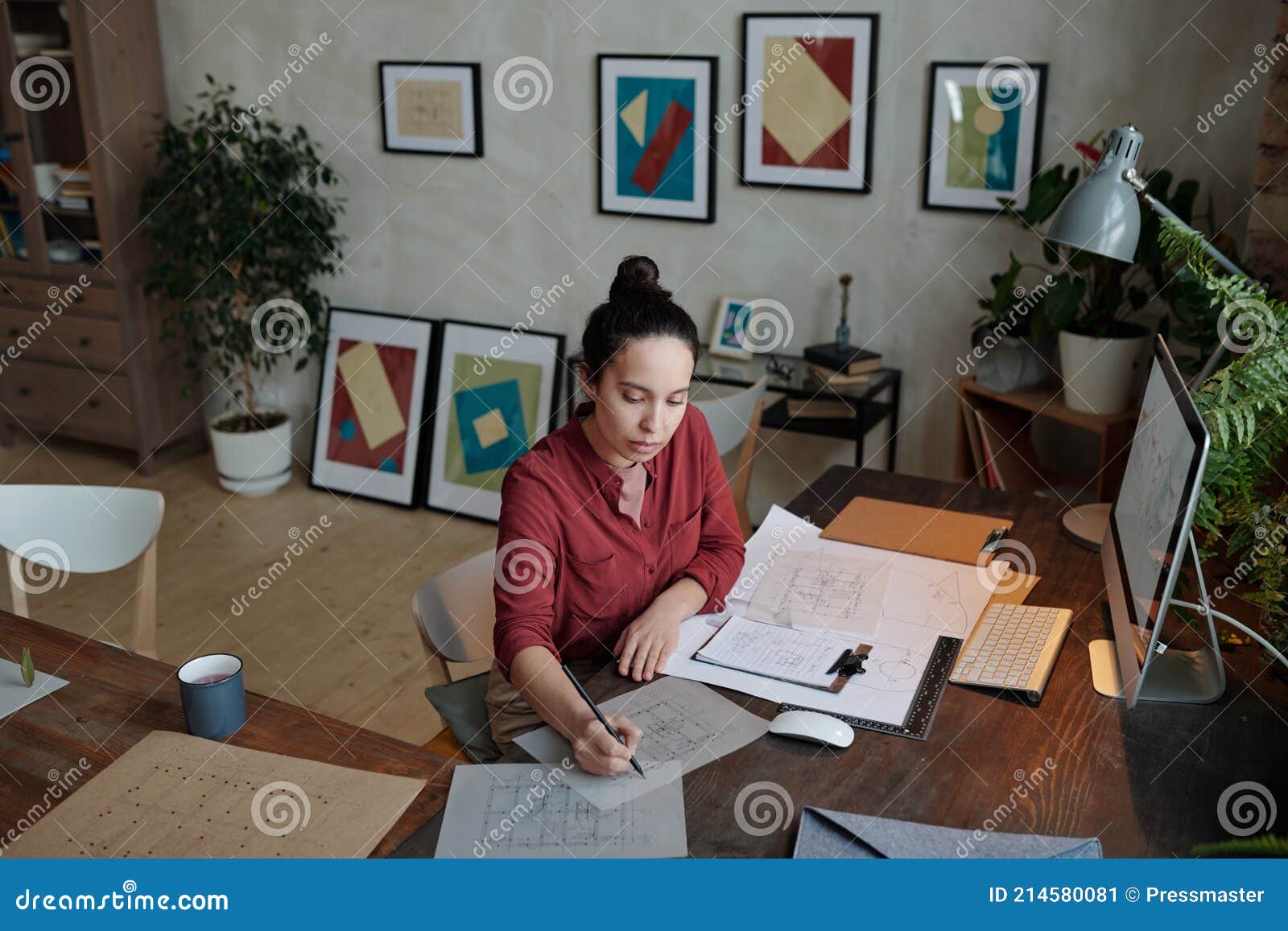 Young Serious Female Architect with Pencil Drawing Sketch of New ...