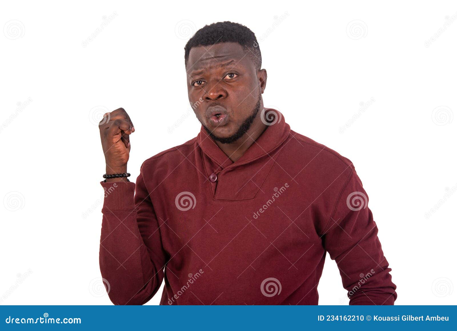 Young Serious Man Pointing Thumb Back Stock Photo - Image of handsome ...