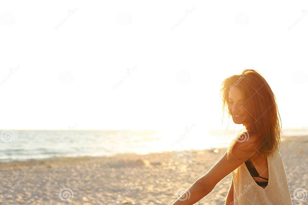 Young Girl on the Beach at Sunset in a Swimsuit Stock Photo - Image of ... Young Girl on the Beach at Sunset in a Swimsuit Stock Photo - Image of ...