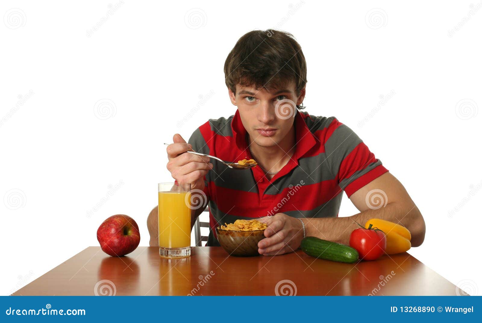 Young Man Eating His Breakfast Stock Photo - Image of adult, cutout ...