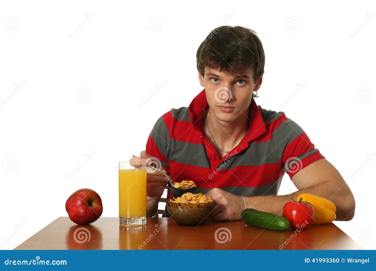 Young Man Eating His Breakfast Stock Photo - Image of handsome, healthy ...