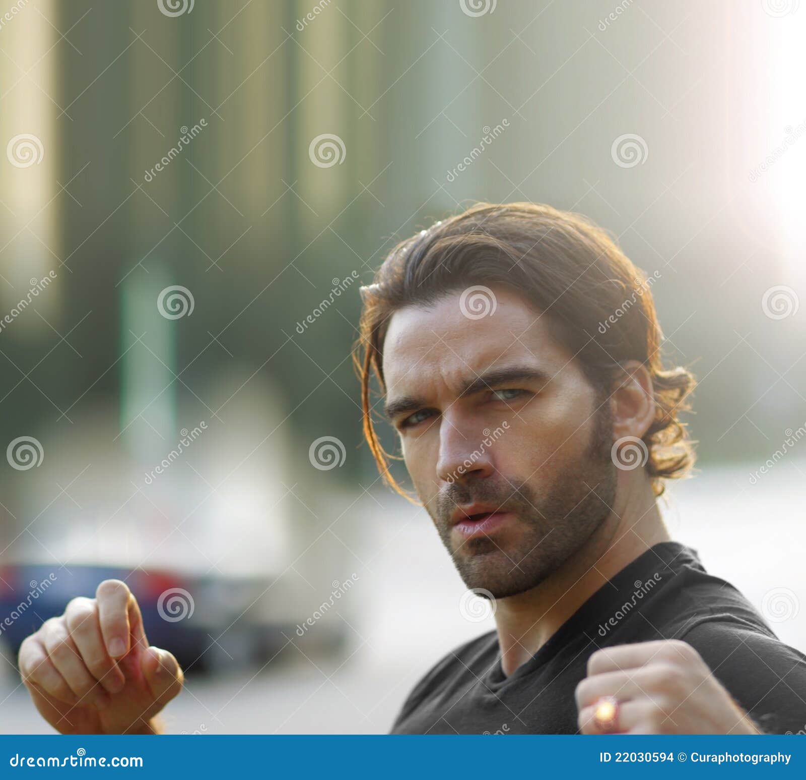 Young man with fists up stock photo. Image of urban, fight - 22030594