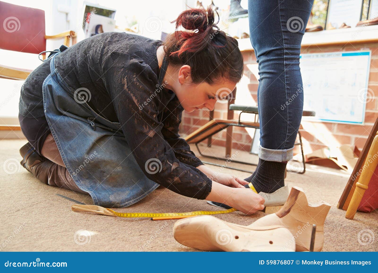 Young Shoemaker Measuring Customers Feet Stock Image - Image of ...