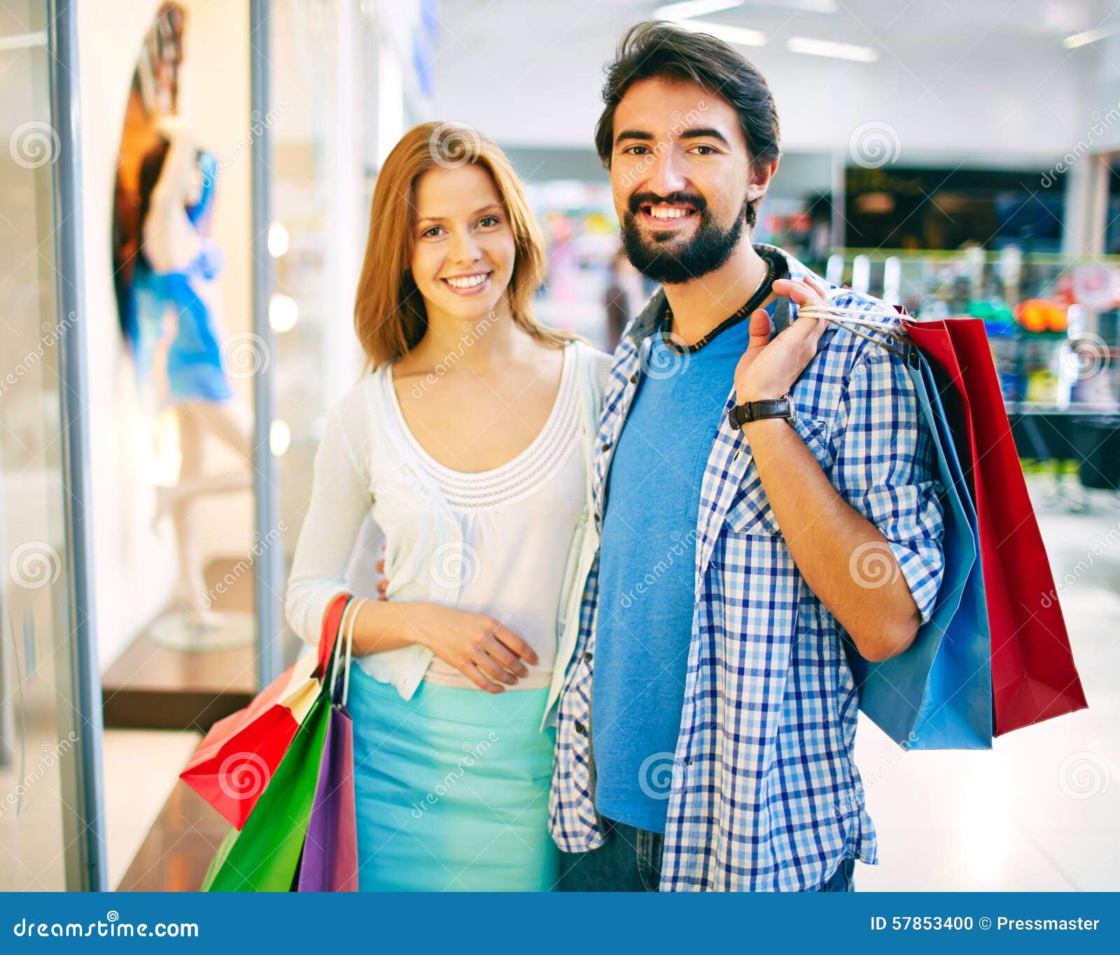 Young shoppers stock photo. Image of consumerism, cheerful - 57853400