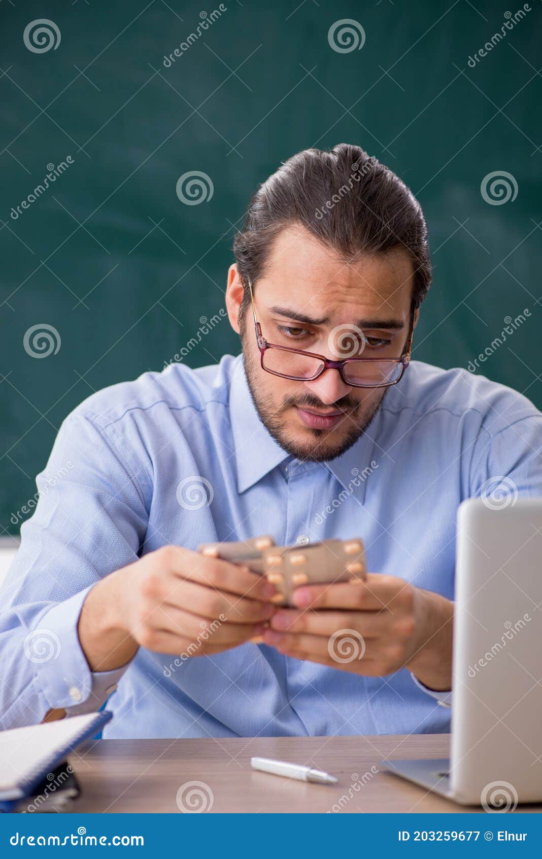 Young Sick Male Teacher in the Classroom Stock Image - Image of drugs ...
