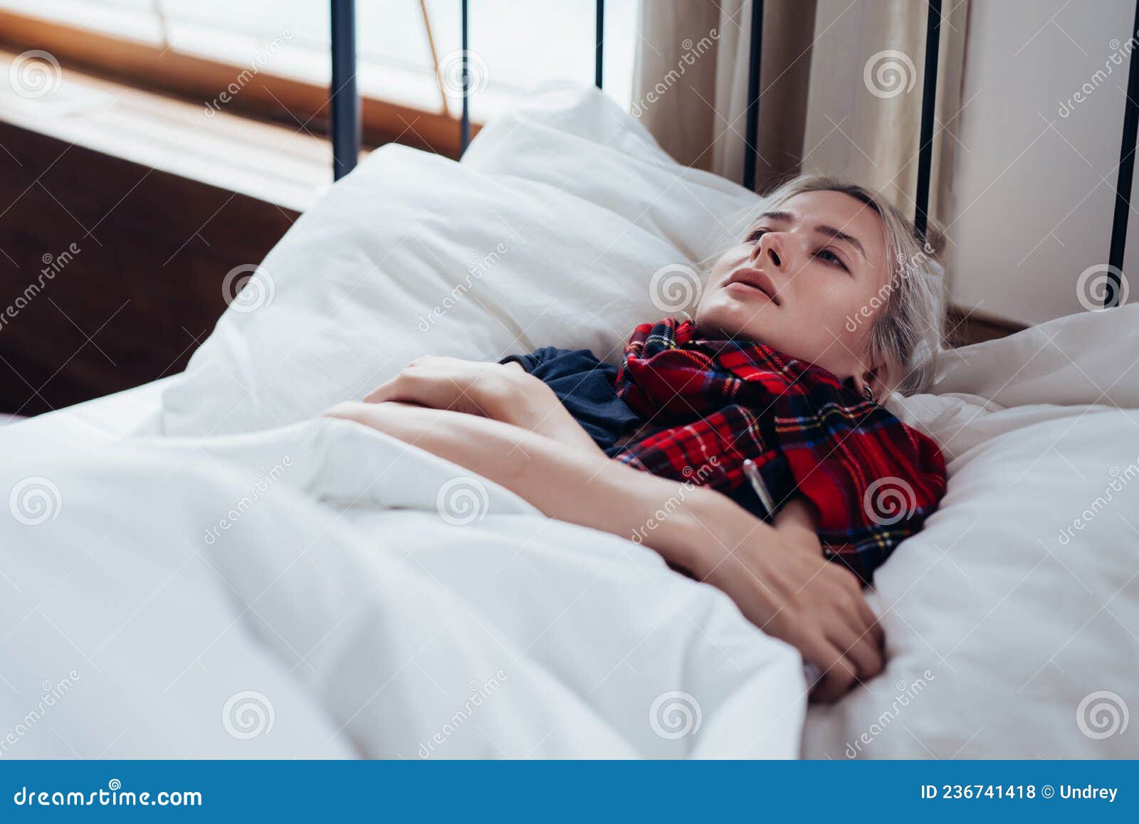 A Young Sick Woman in Bed with Chills Stock Photo - Image of simulate ...