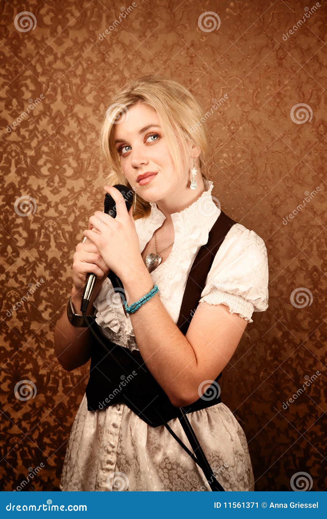 Young Singer stock image. Image of stand, hand, blonde - 11561371
