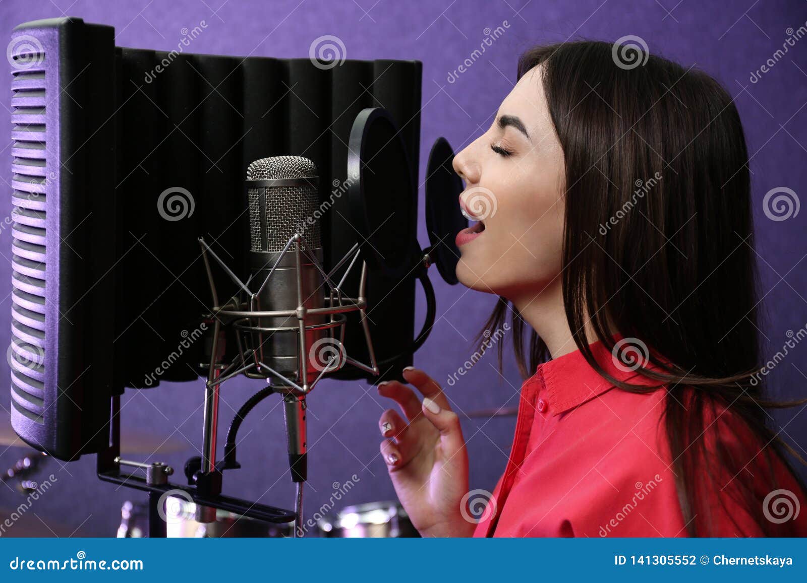Young Singer with Microphone Recording Song Stock Photo - Image of ...