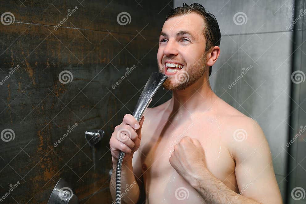 Young Single Handsome Caucasian Man Are Taking Shower In The Bathroom