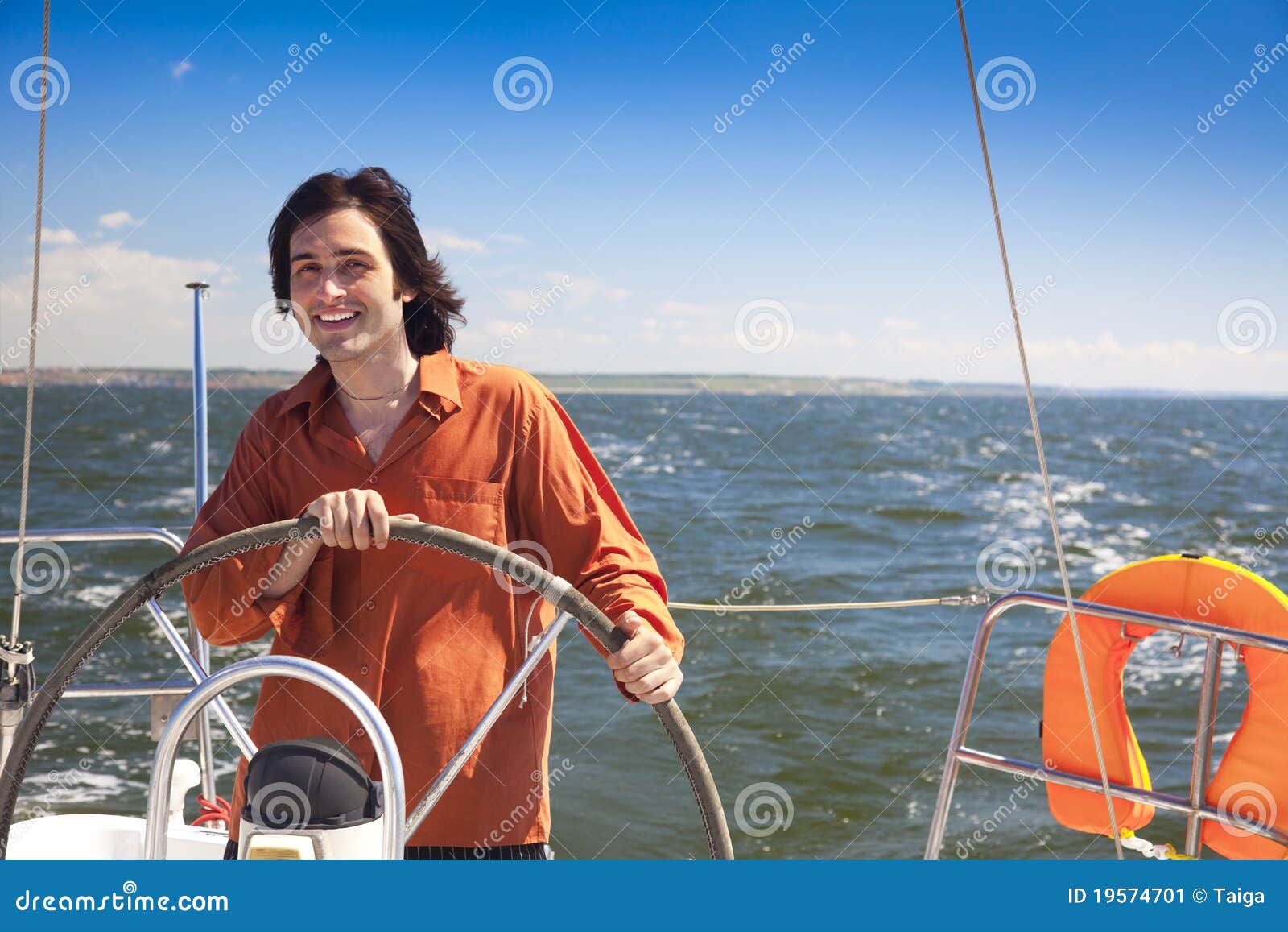 Young Skipper Driving Sailboat Stock Image - Image of seaman, sailboat ...