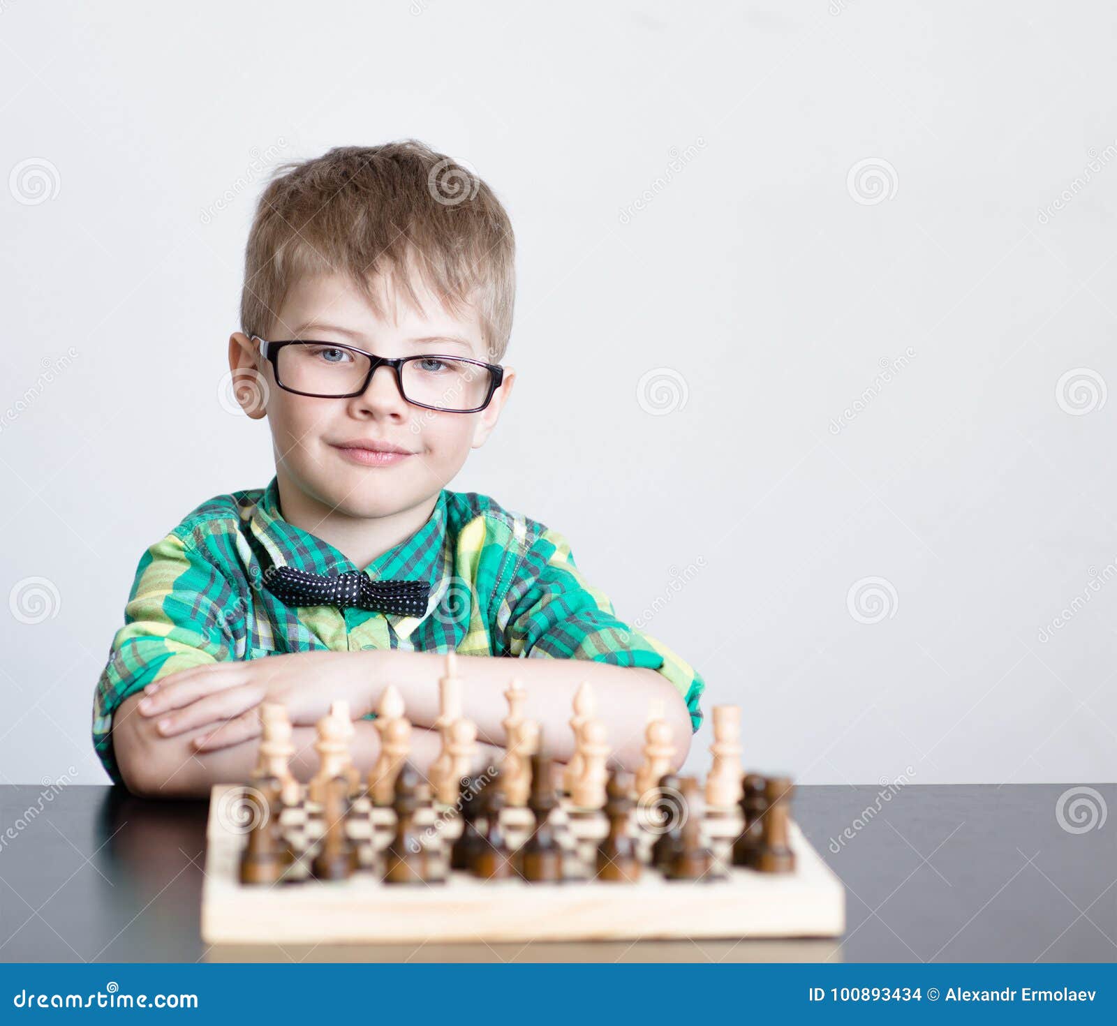 Young Smart Boy Playing Chess Stock Photo - Image of human, competition ...