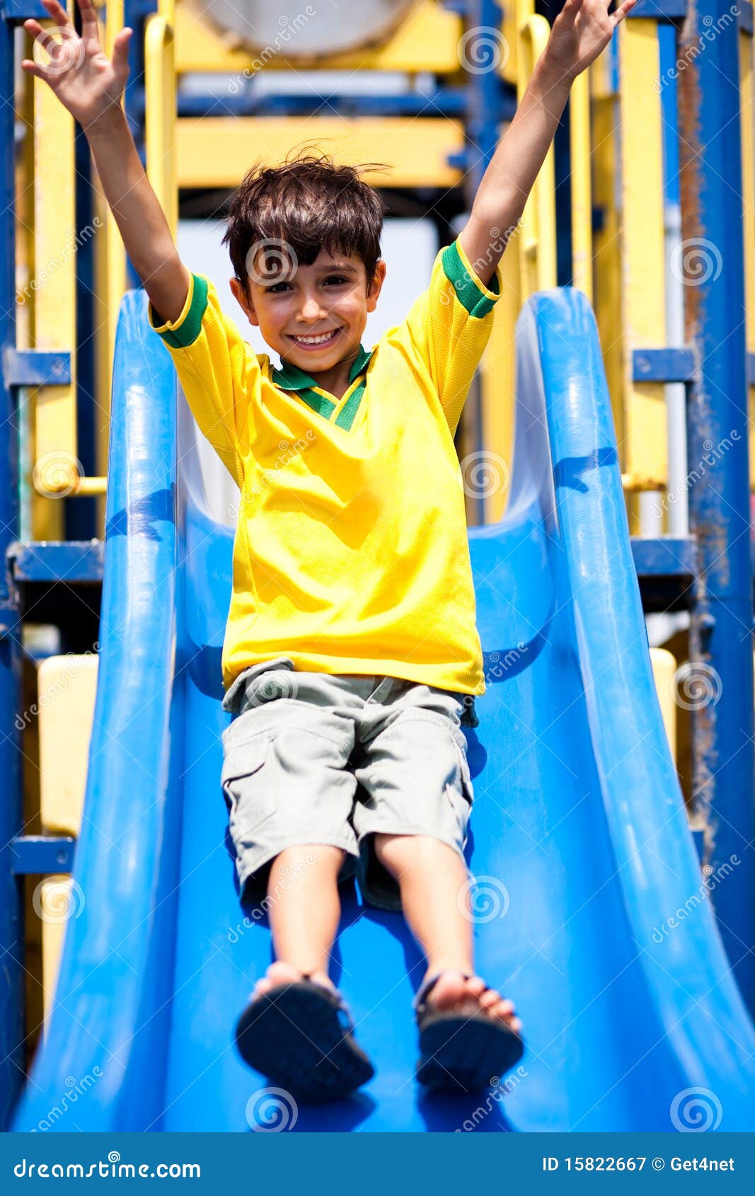 Young Smart Kid Sliding Down the Swing Stock Image - Image of looking ...
