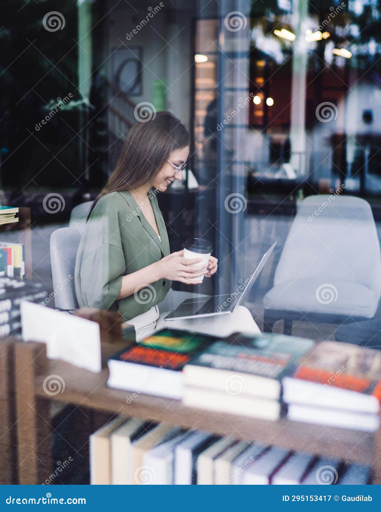 Young Smart Lady Using Laptop in Bookstore Stock Image - Image of ...